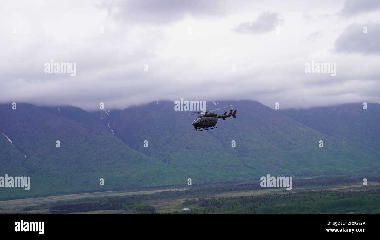 An Alaska Army National Guard LUH-72 Lakota helicopter flies alongside ...