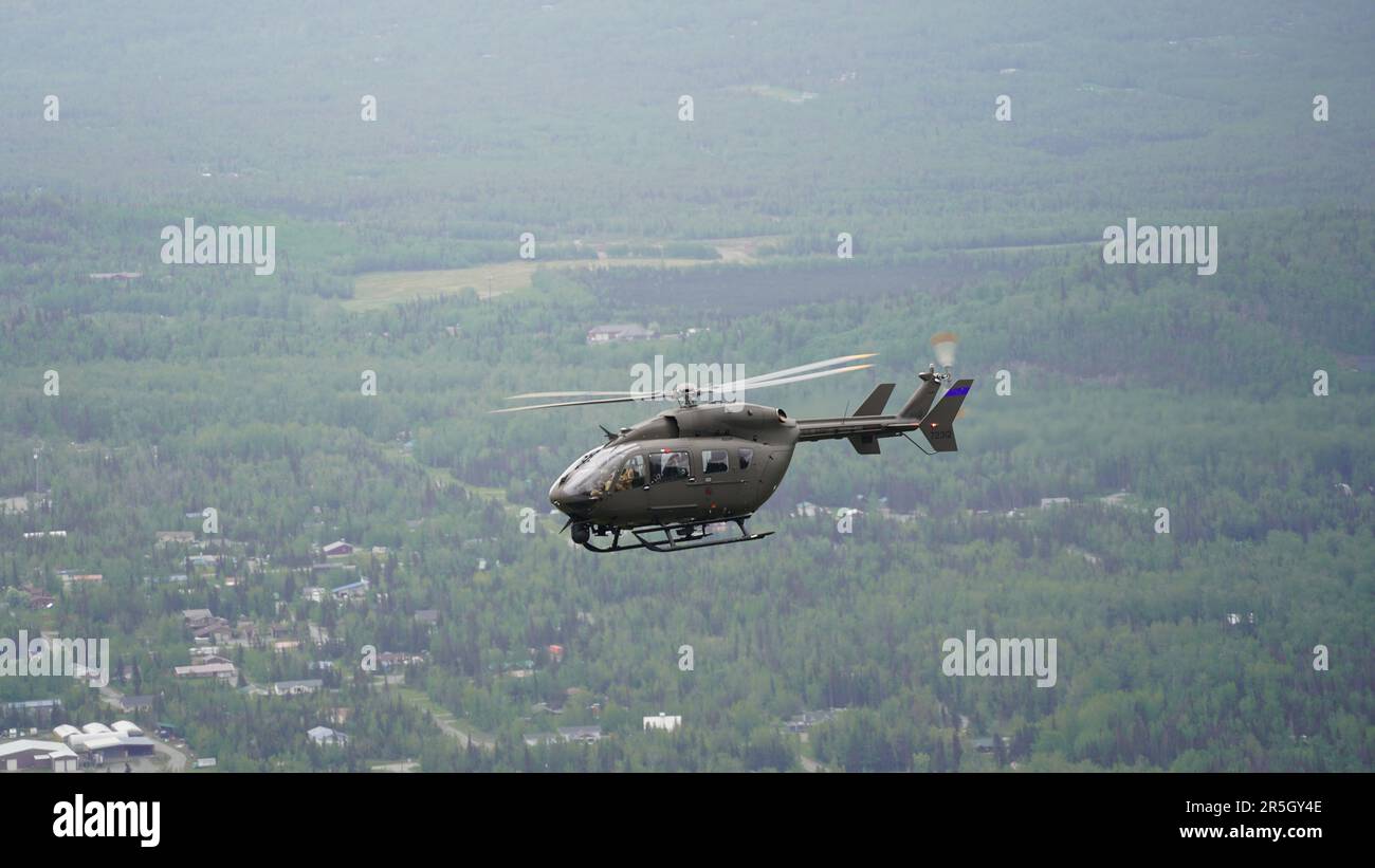 An Alaska Army National Guard LUH-72 Lakota helicopter flies alongside ...