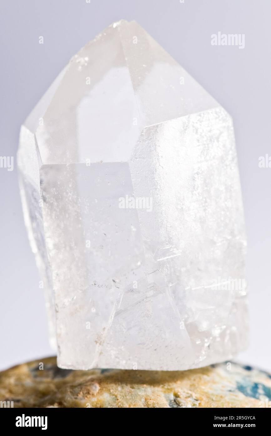 White luminous mountain crystal quartz with white background Stock ...