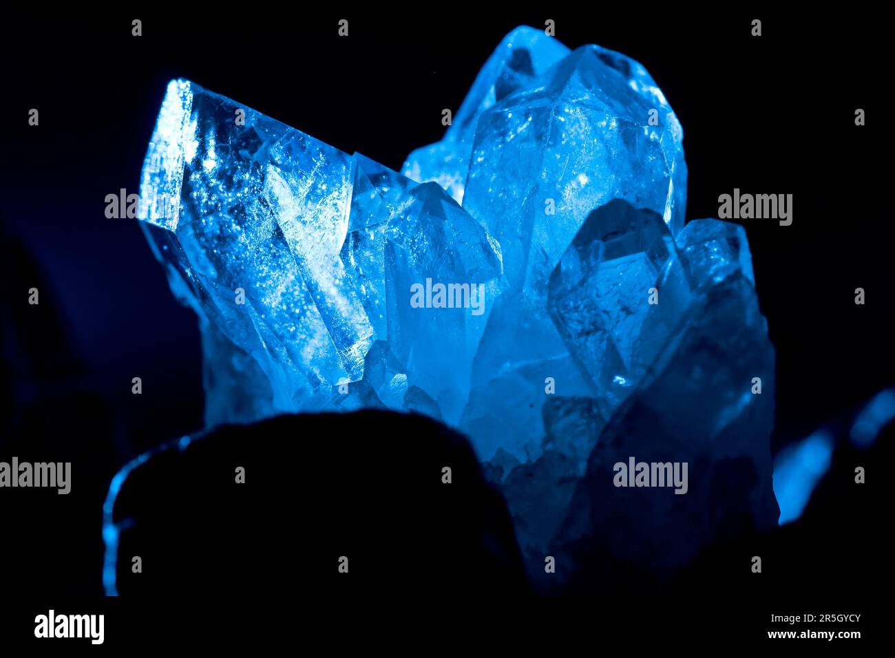 White blue glowing mountain crystal quartz with backlighting Stock ...