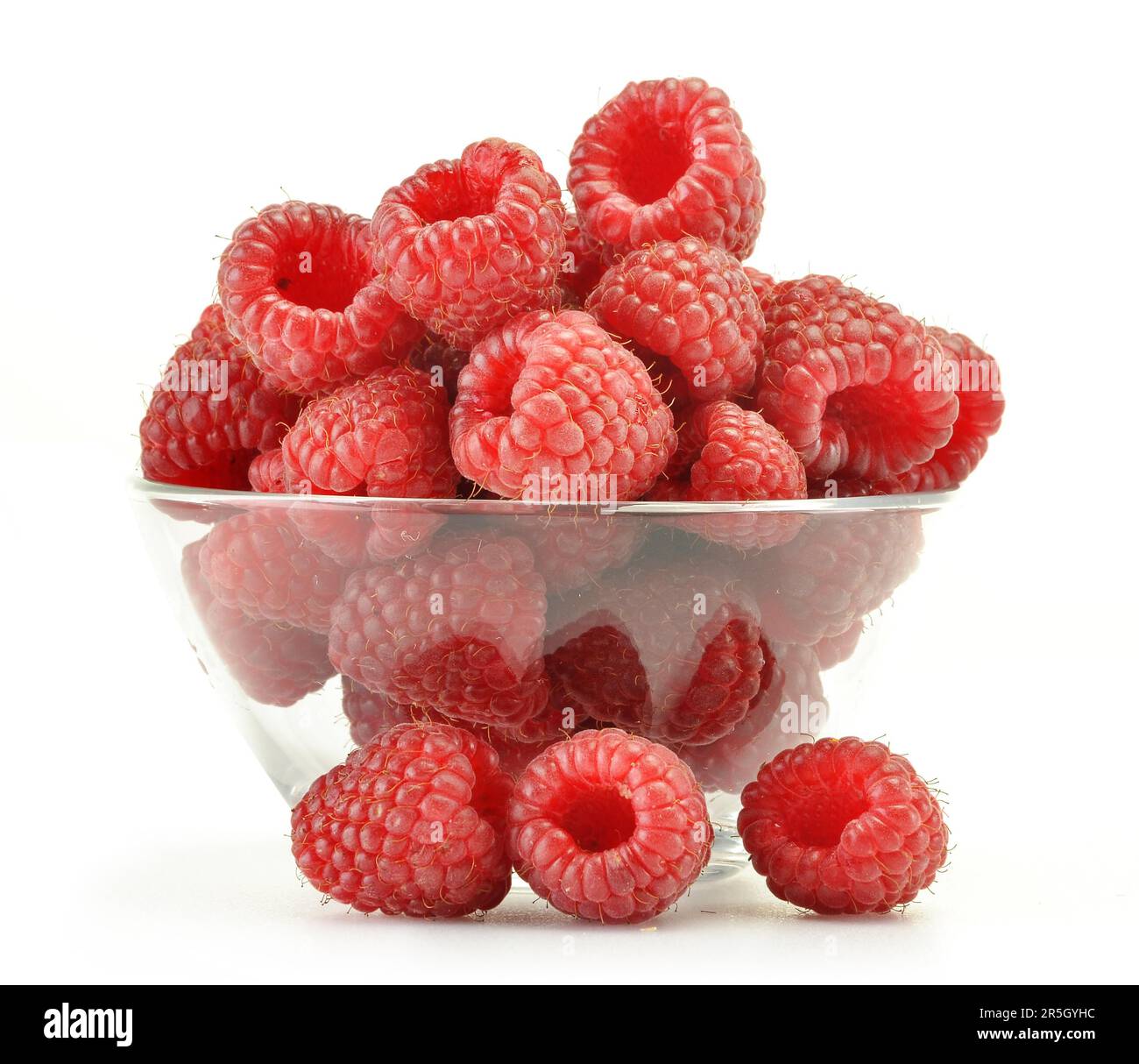 A dish with fresh raspberries isolated on white Stock Photo - Alamy