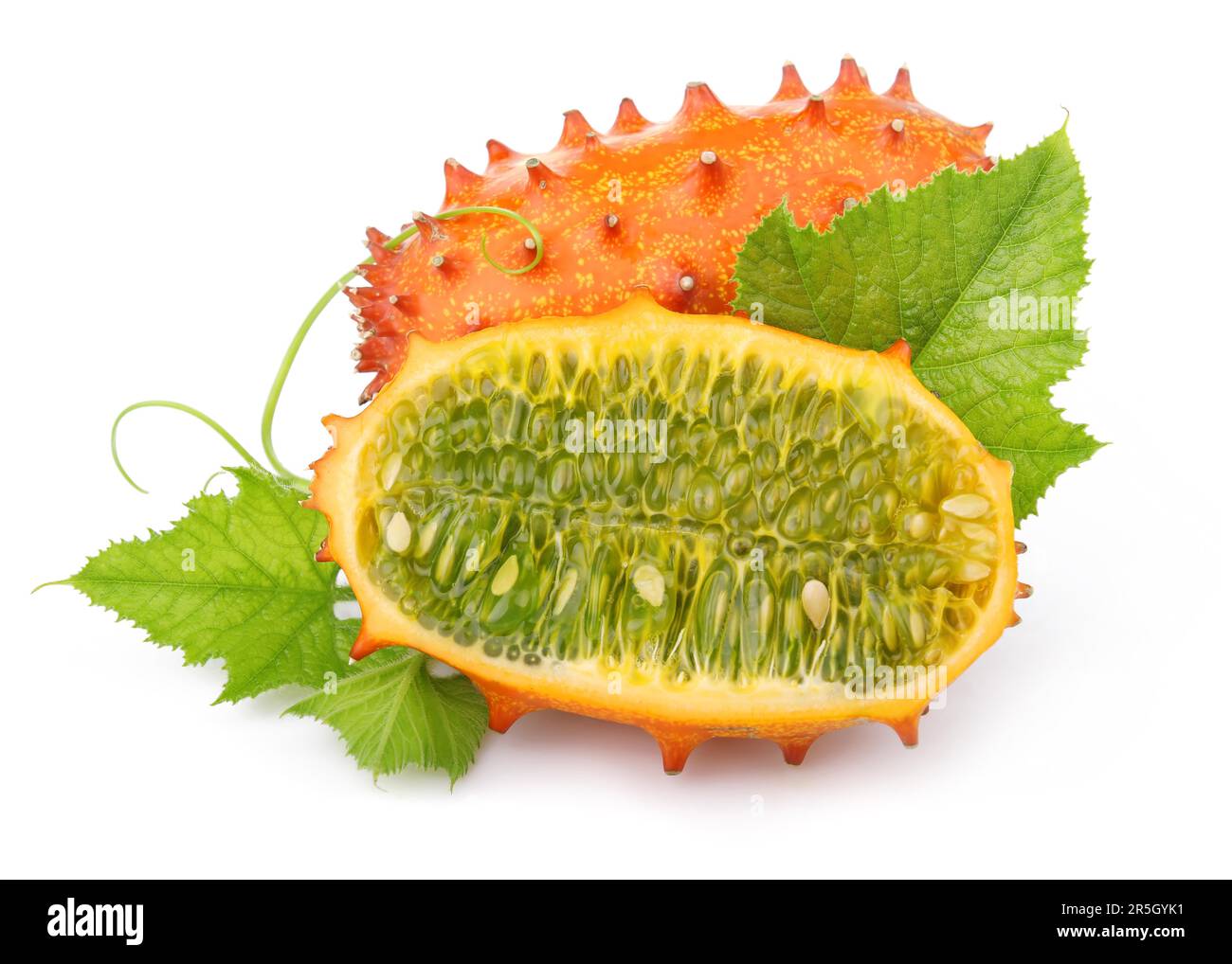 Ripe sliced kiwano fruits isolated on white background Stock Photo - Alamy