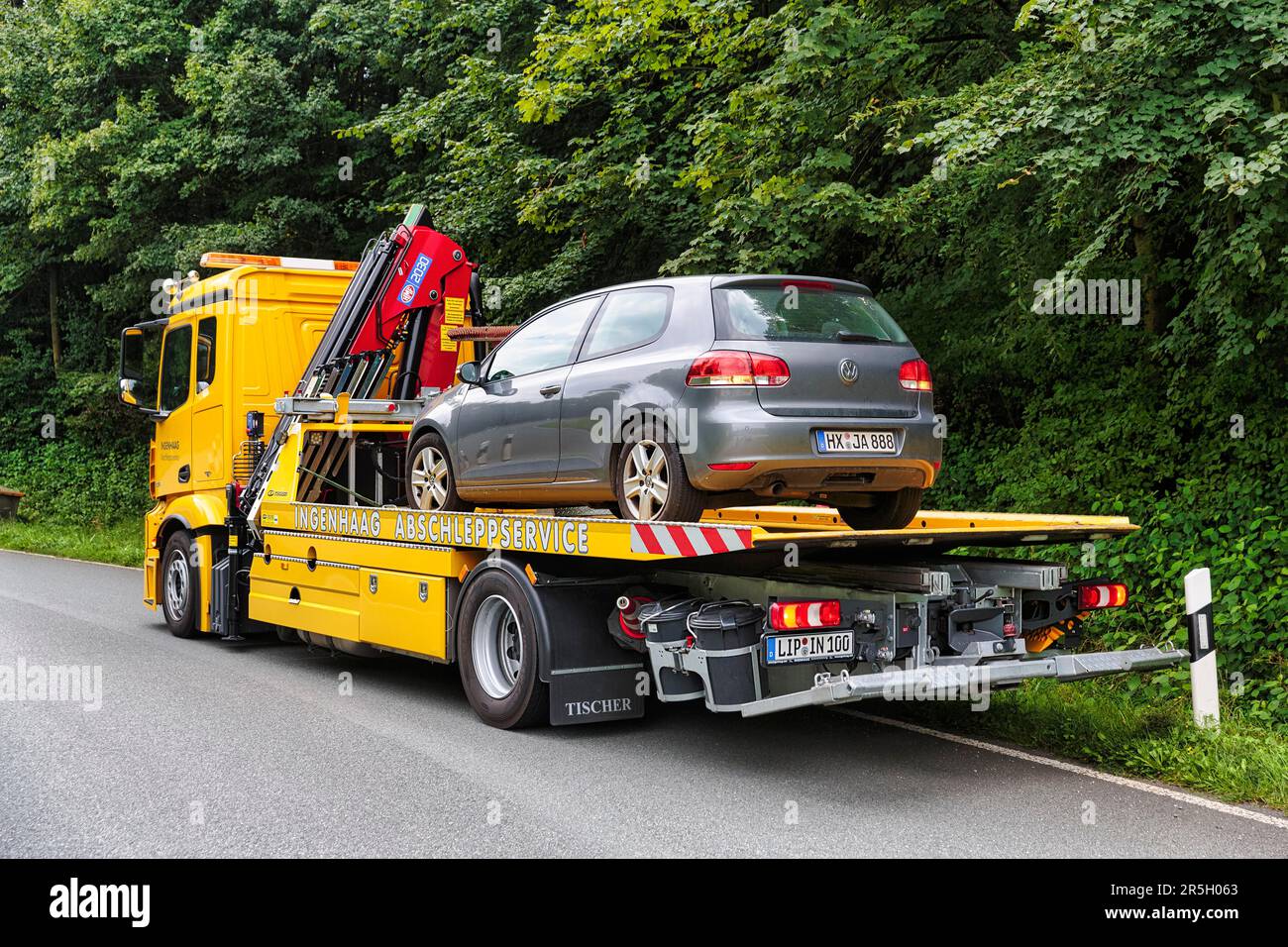 Defective VW Golf on tow truck at roadside, car breakdown, North Rhine ...