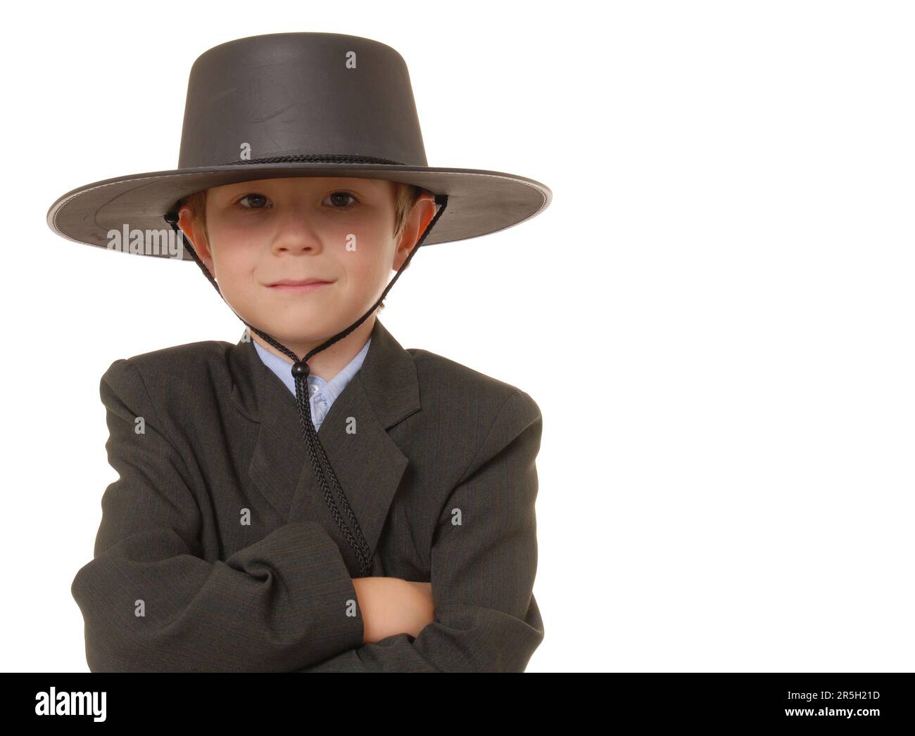 Young boy in suit wearing a western style hat Stock Photo - Alamy