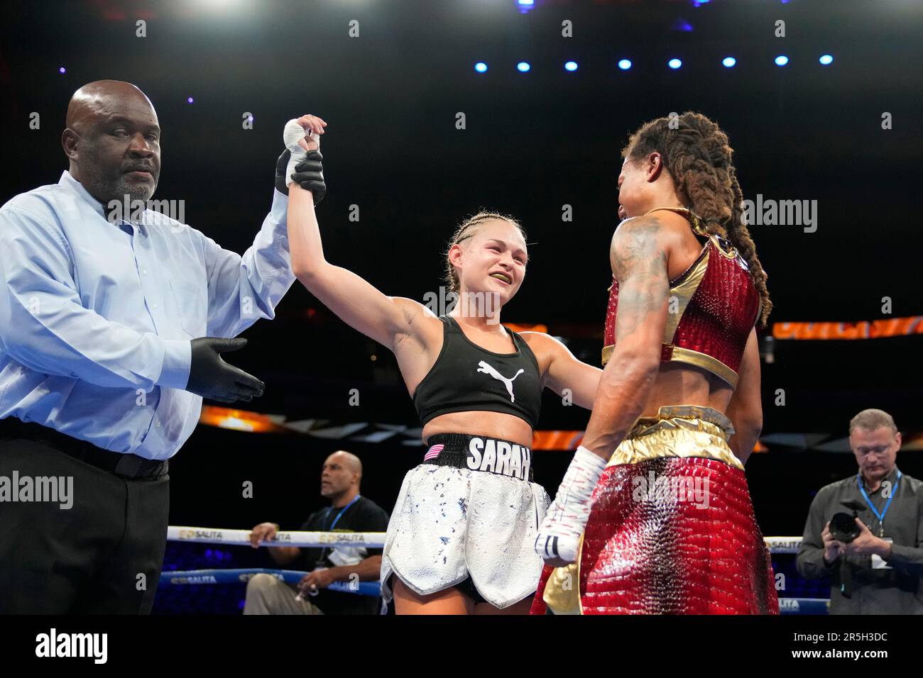 Sarah Liegmann, of Germany, is declared the winner over Carisse Brown ...