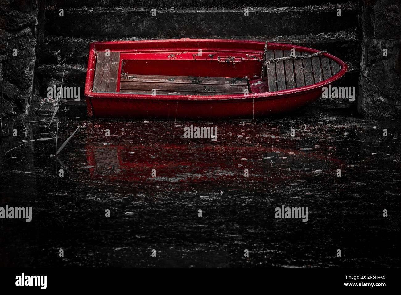 Old red rowing boat with light atmosphere Stock Photo - Alamy