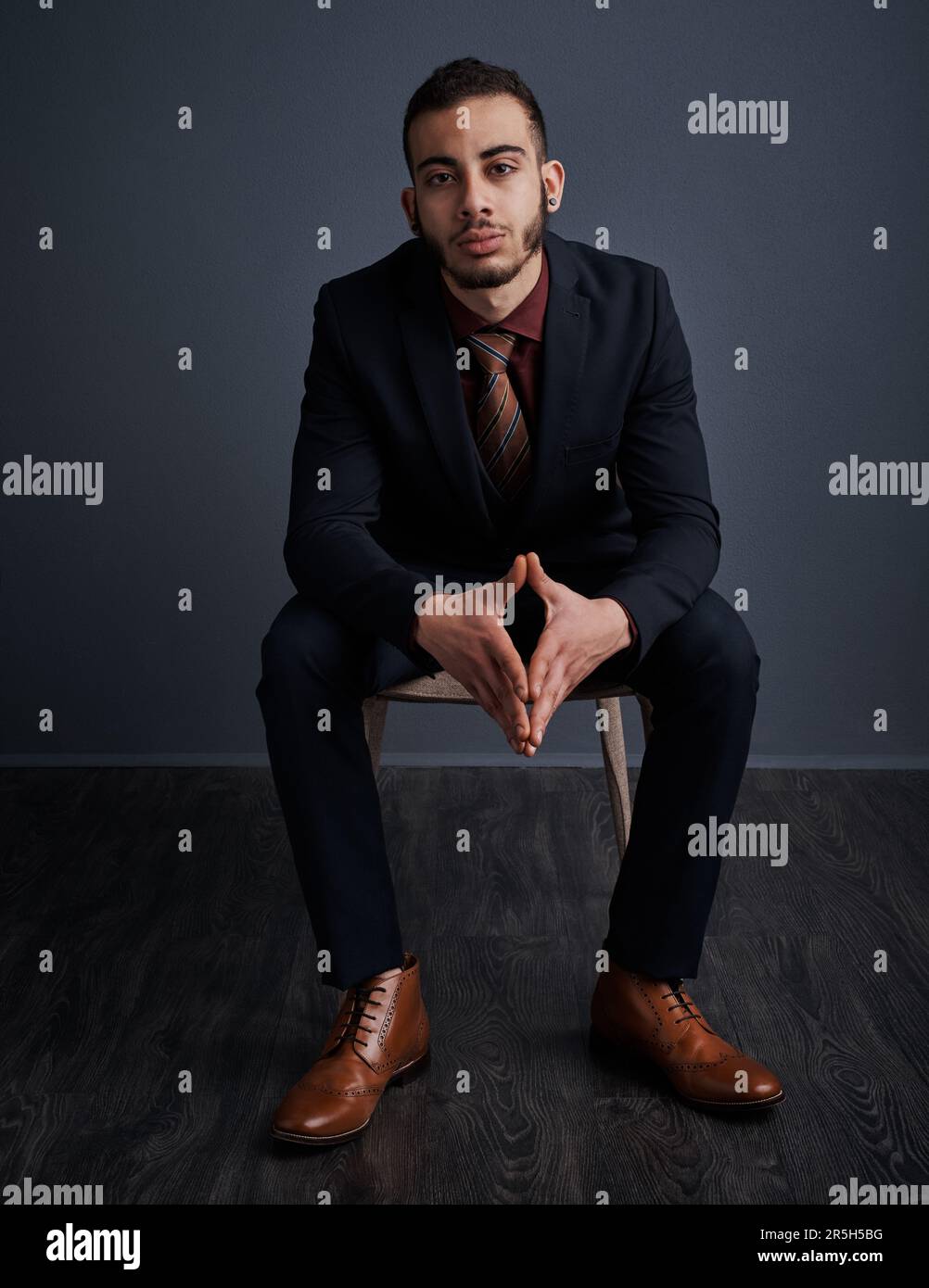 Behave like the boss you want to become. Studio portrait of a stylish ...
