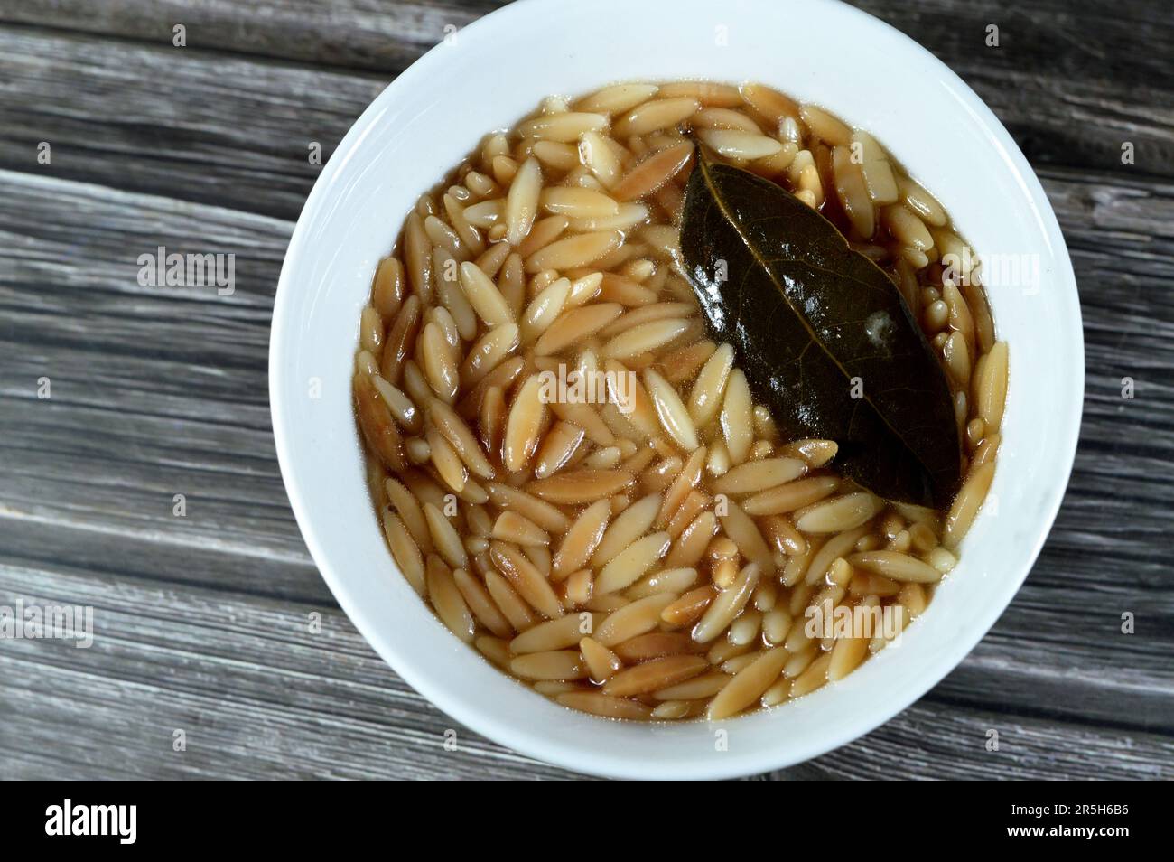Middle Eastern Orzo Pasta Egyptian soup also known as Shorbet Lesan El ...