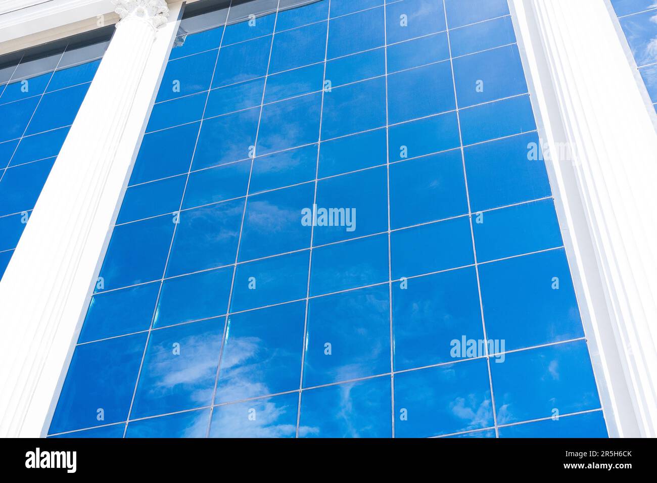 Crystal Reflections: A Building Facade of Grey Granite and Shimmering ...