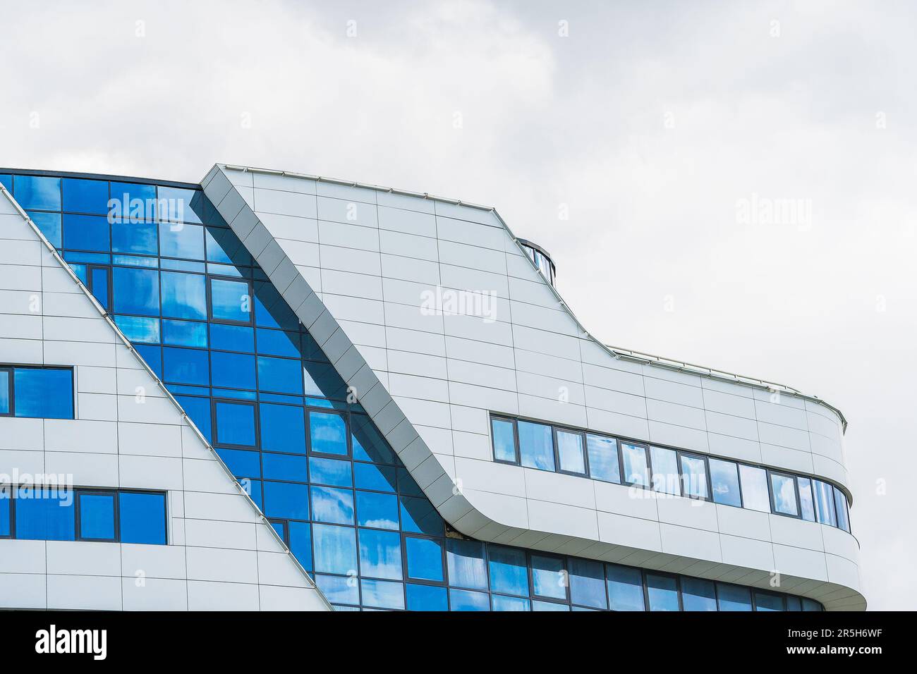 Crystal Reflections: A Building Facade of White tiles and Shimmering ...