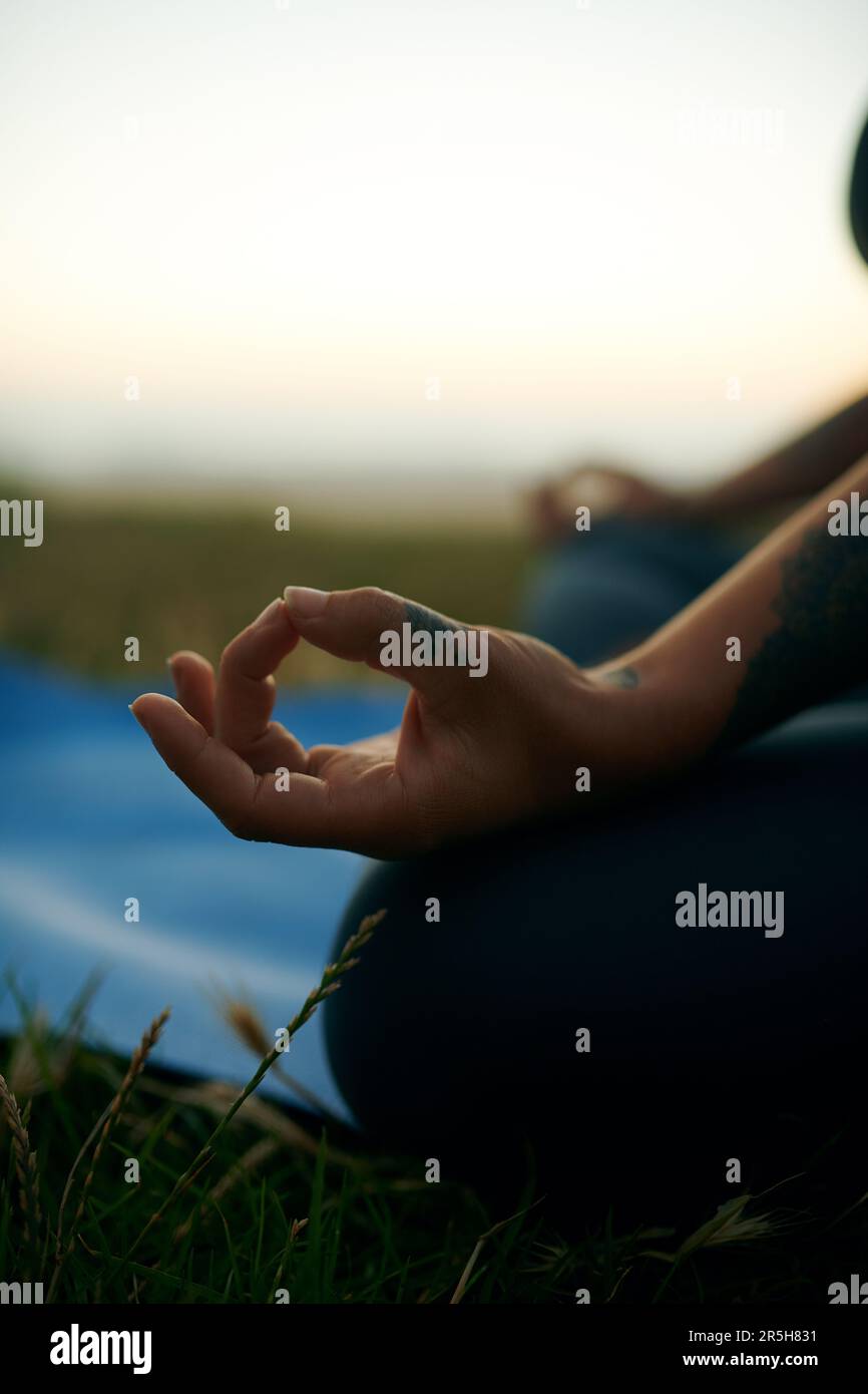 Yoga is an inward journey. an unrecognizable woman sitting alone and ...