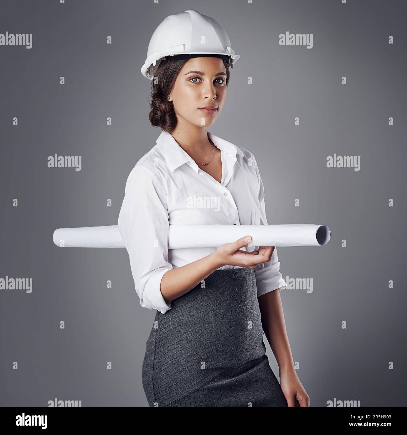 More than just a pretty face. Portrait of a well-dressed civil engineer ...