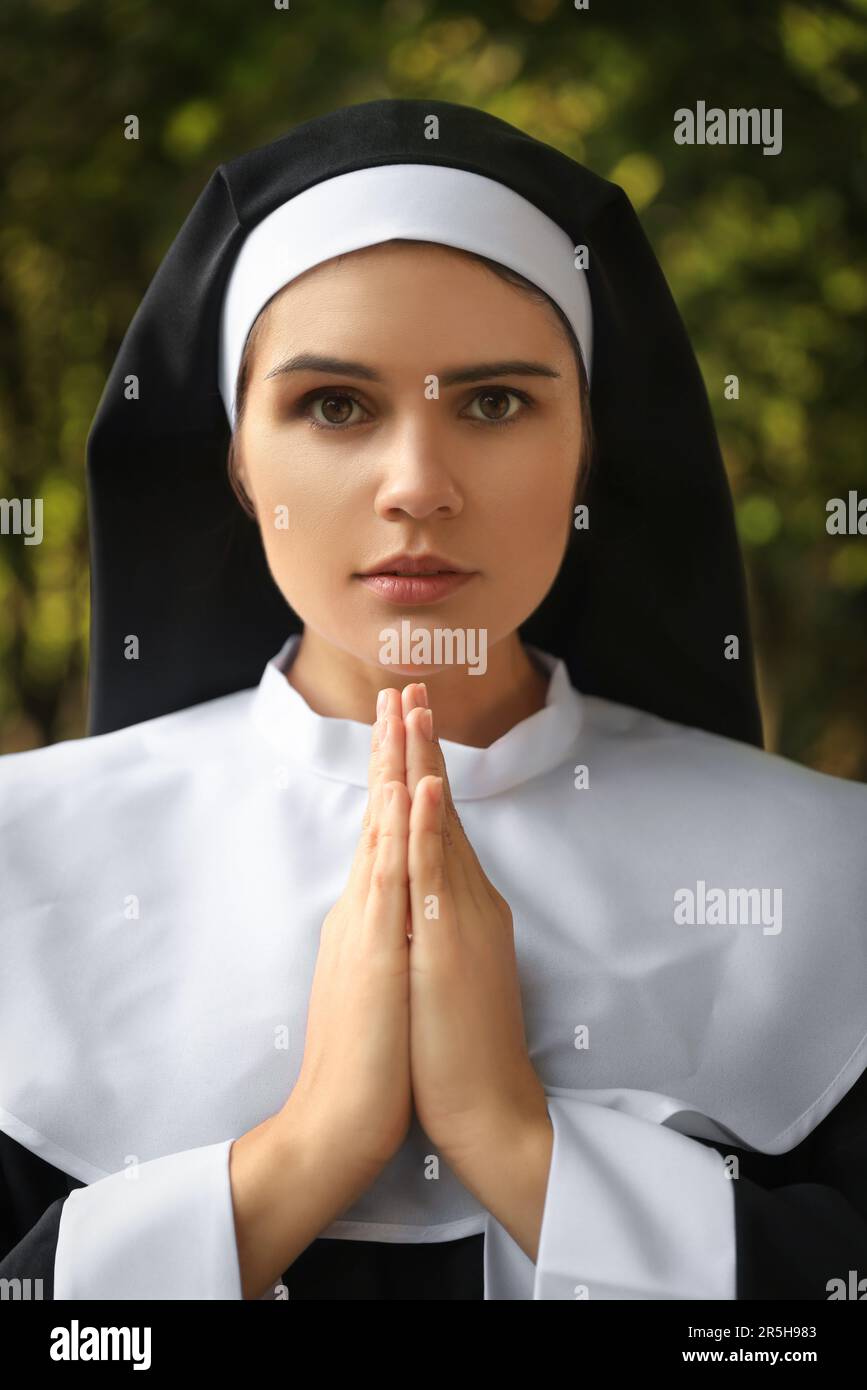 Nun hands clasped hi-res stock photography and images - Alamy