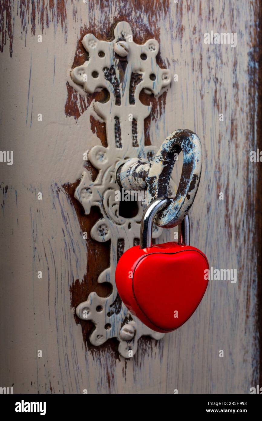 Red Heart Lock On Skeleton Key On Door Lock Still Life Stock Photo - Alamy