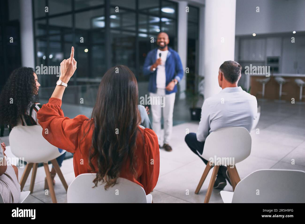 Woman raising finger ask hi-res stock photography and images - Alamy