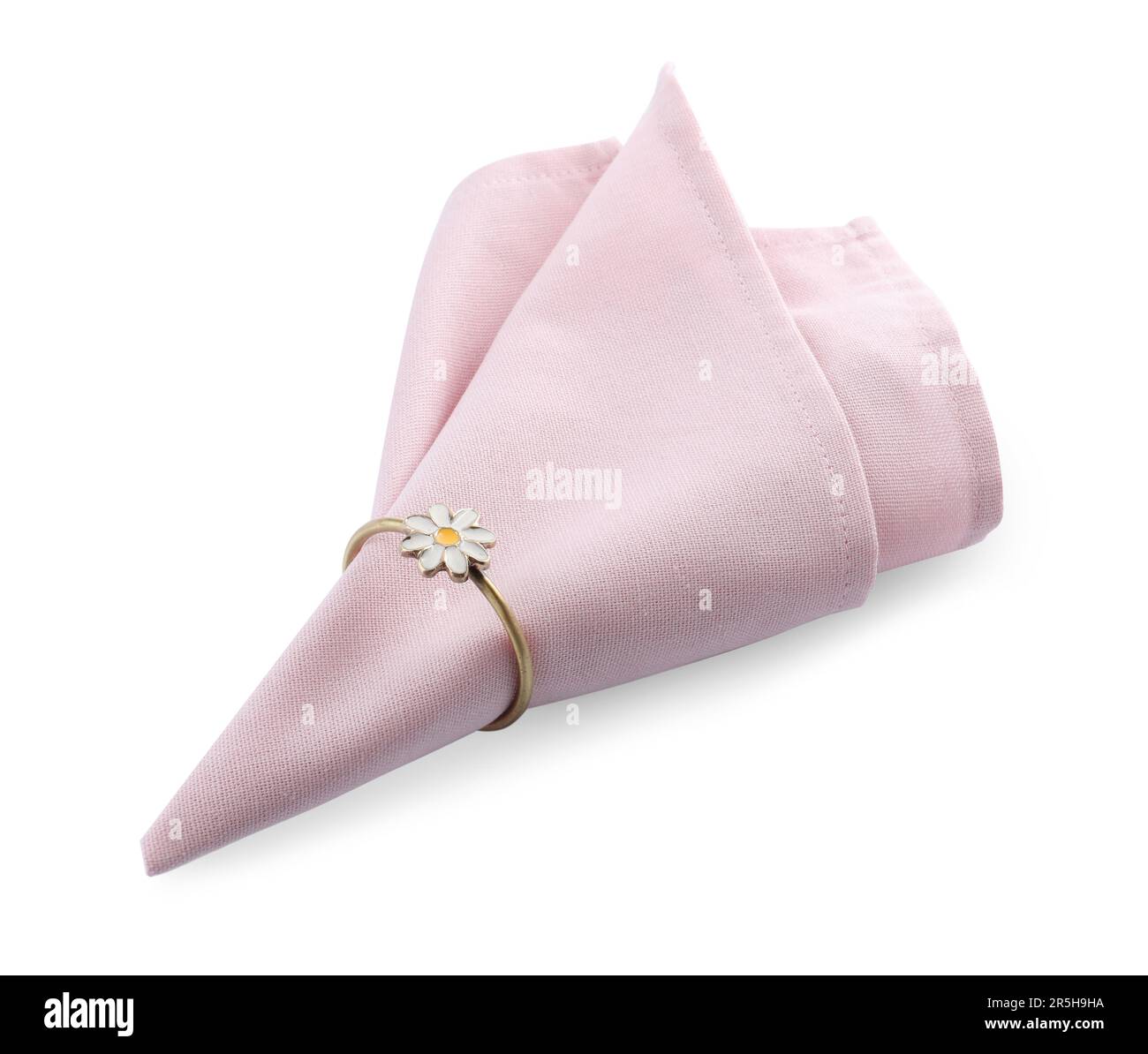Fabric napkin with decorative ring for table setting on white ...