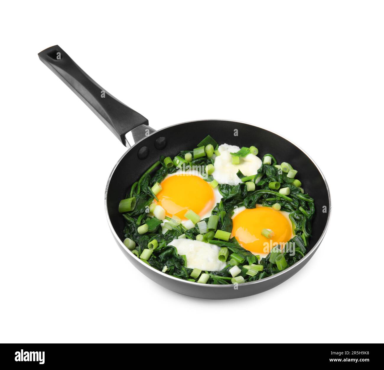 Pan with green shakshuka isolated on white Stock Photo - Alamy