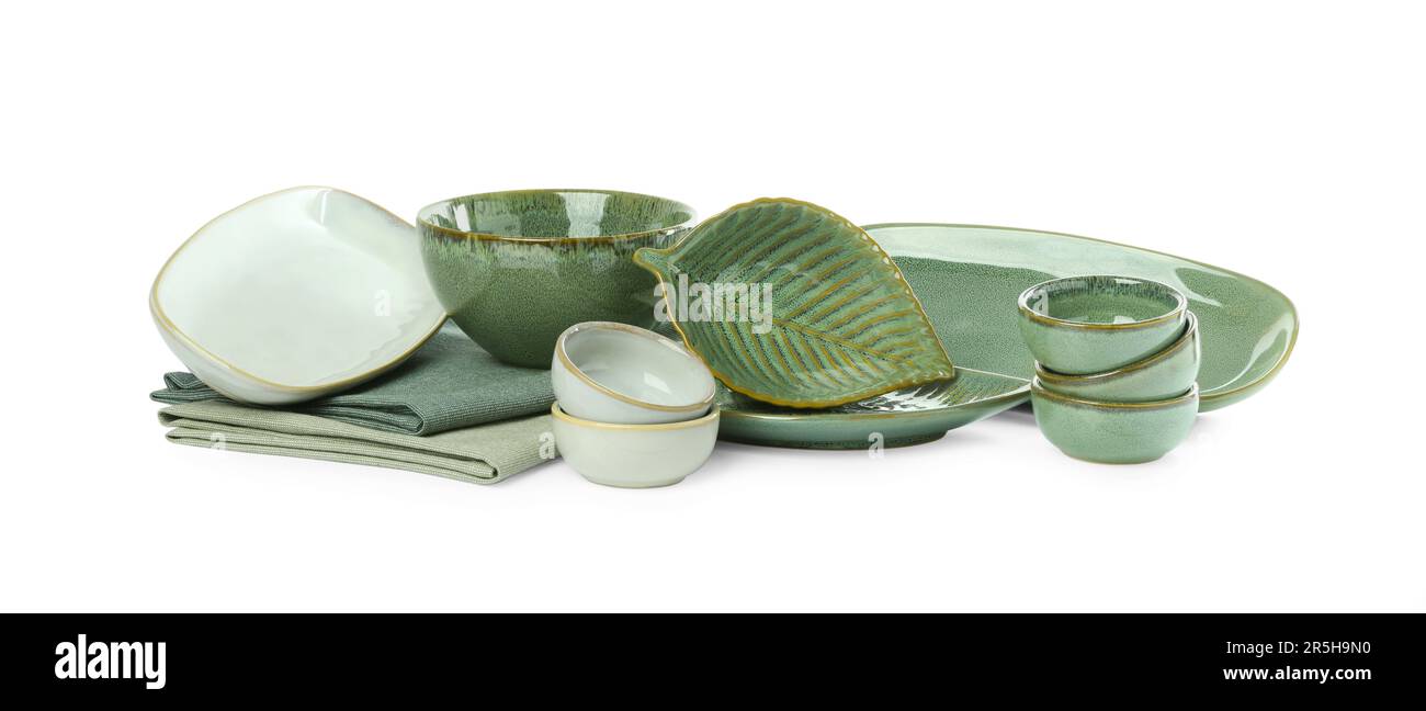 Different stylish empty dishware on white background Stock Photo - Alamy