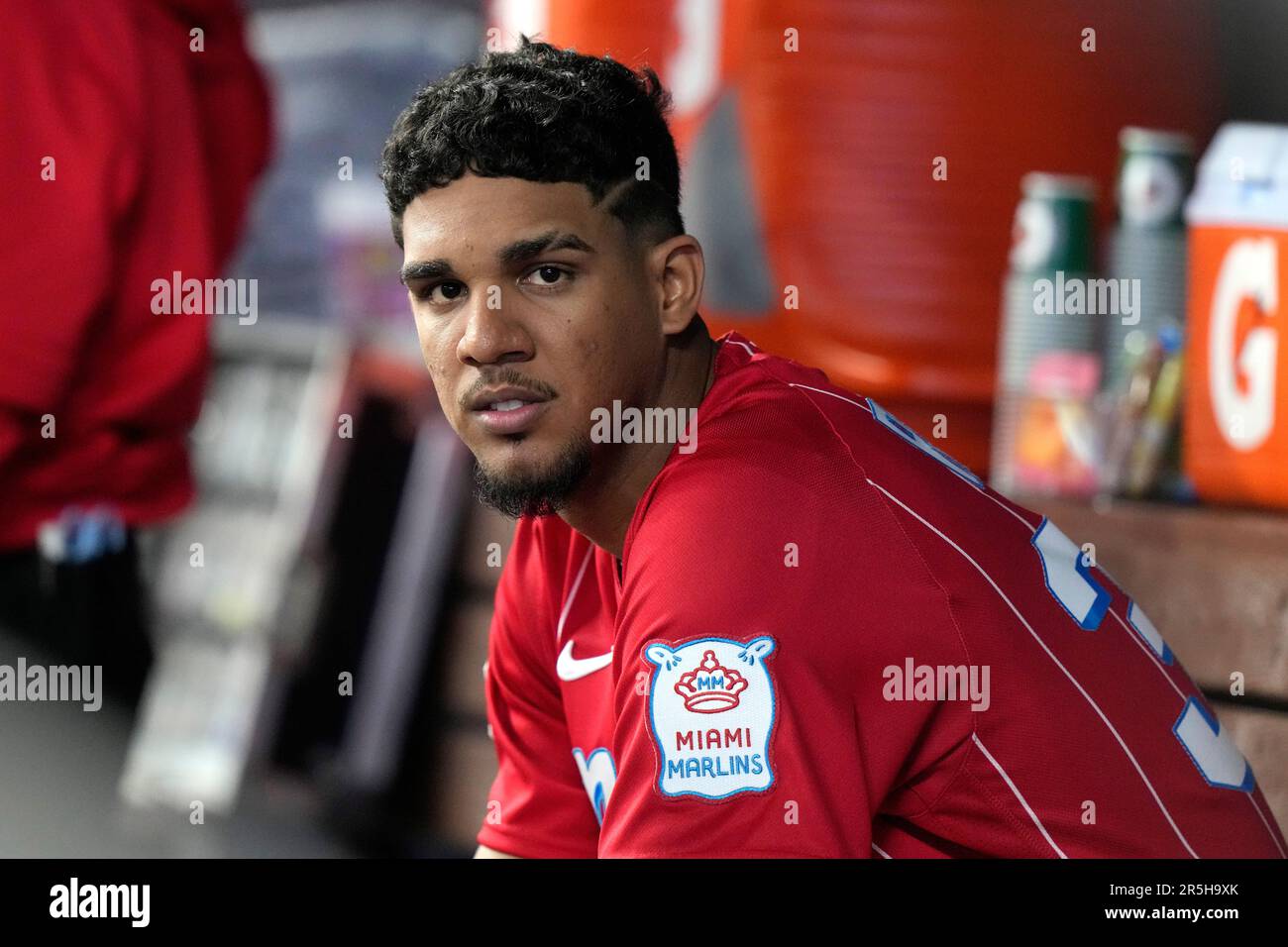 Miami Marlins starting pitcher Eury Perez sits in the dugout during a ...