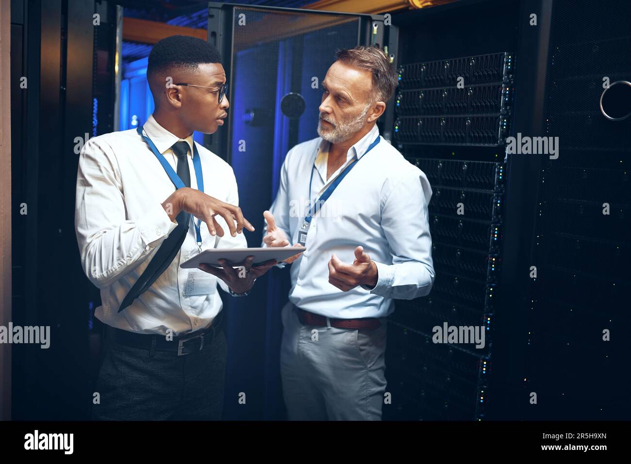 We have a slight technical issue here. two technicians using a digital ...