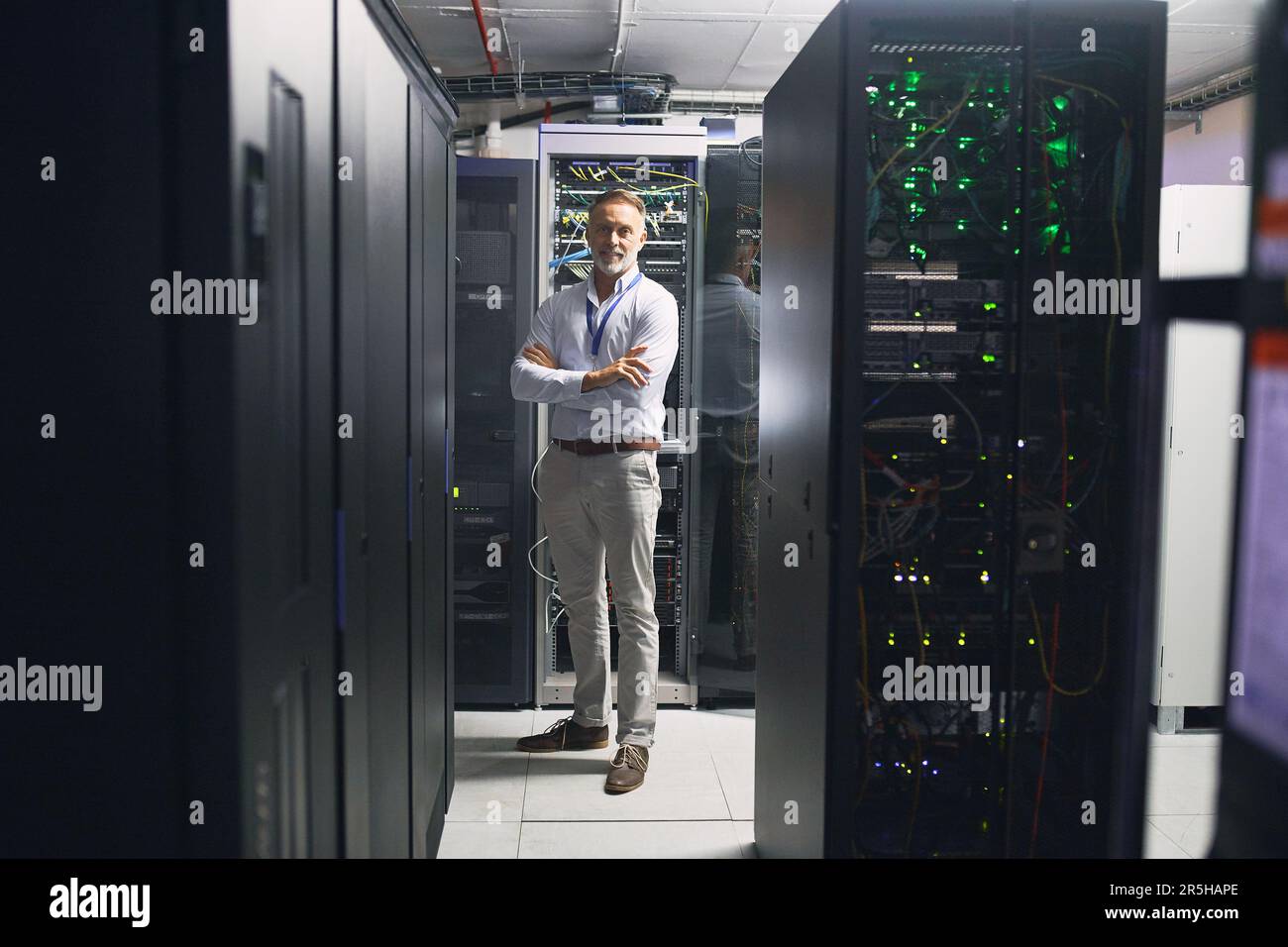 Welcome to my world of big data. Portrait of a mature man working in a ...