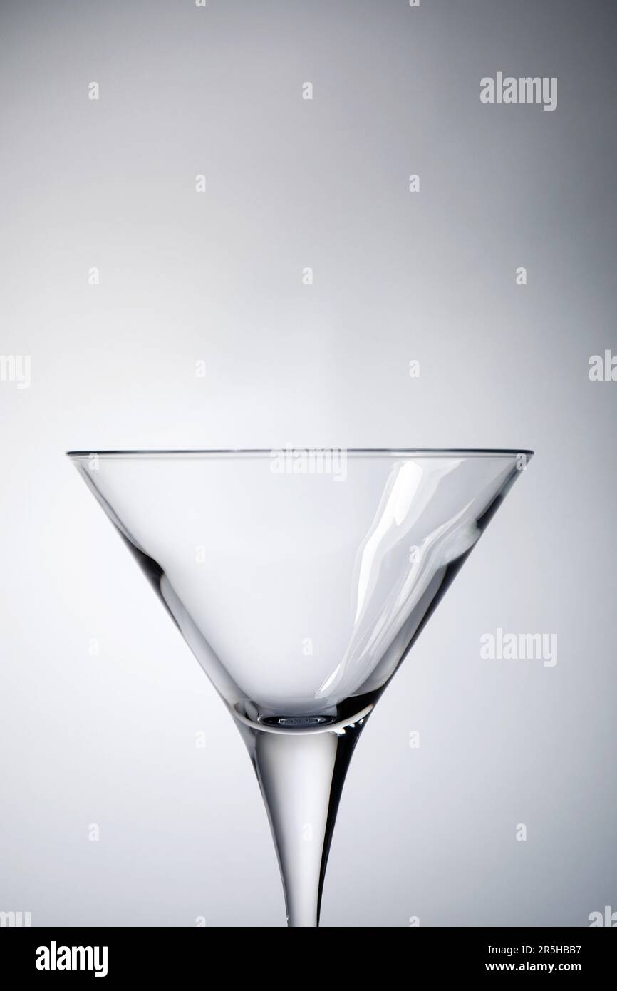Elegant empty martini glass on grey background, closeup. Space for text Stock Photo - Alamy