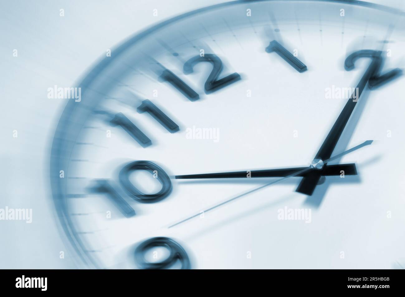 Fleeting time concept. Clock on light background, closeup. Motion ...