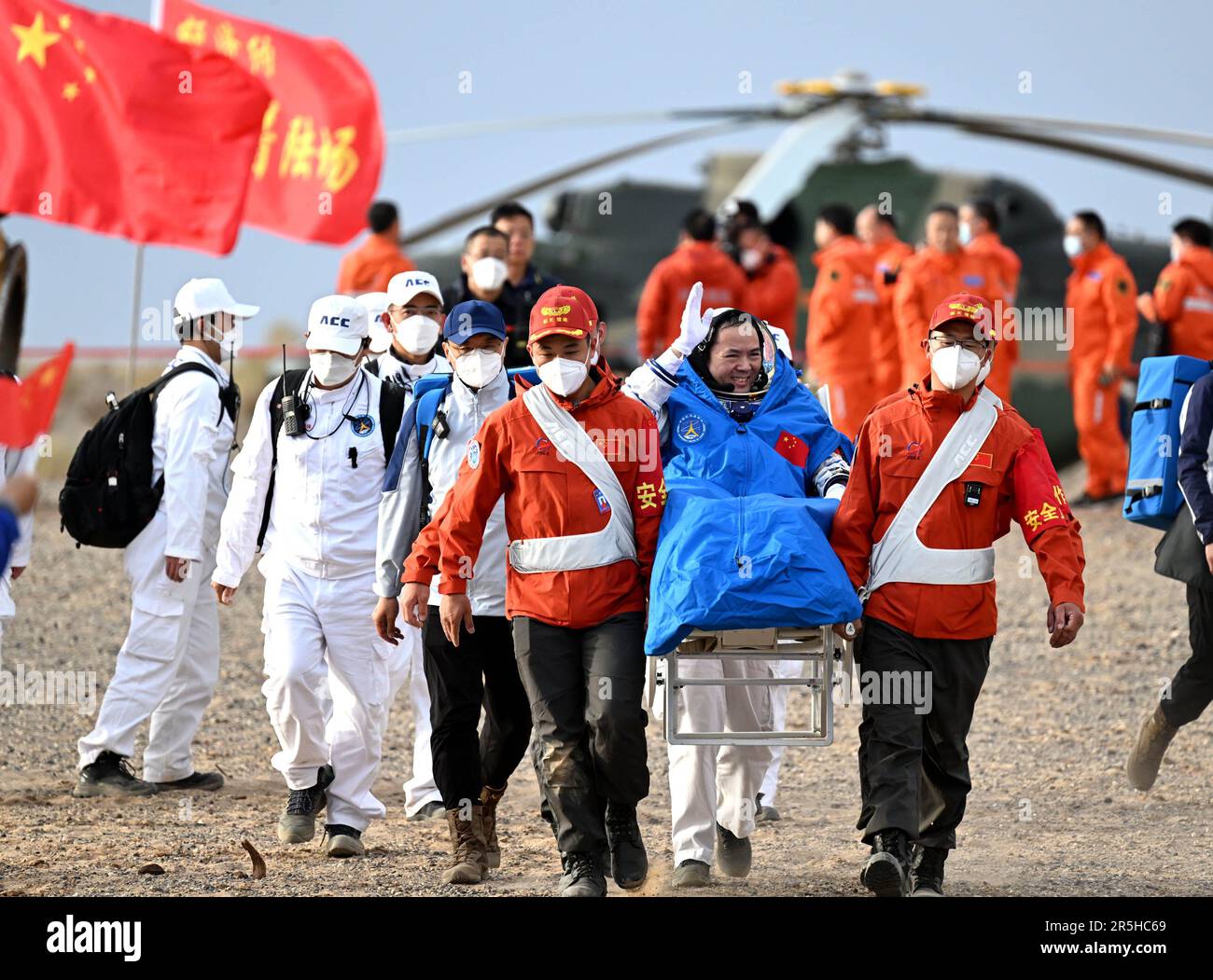 Dongfeng Landing Site. 4th June, 2023. Astronaut Zhang Lu is out of the return capsule of the ...