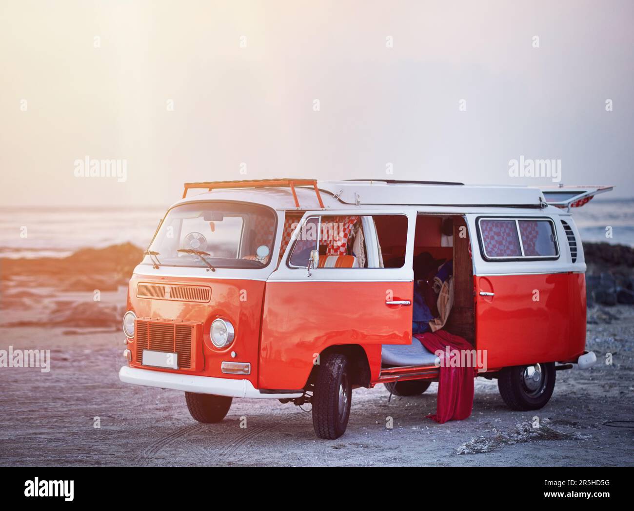 Time for a beach break. Full length shot of an empty van parked at the ...