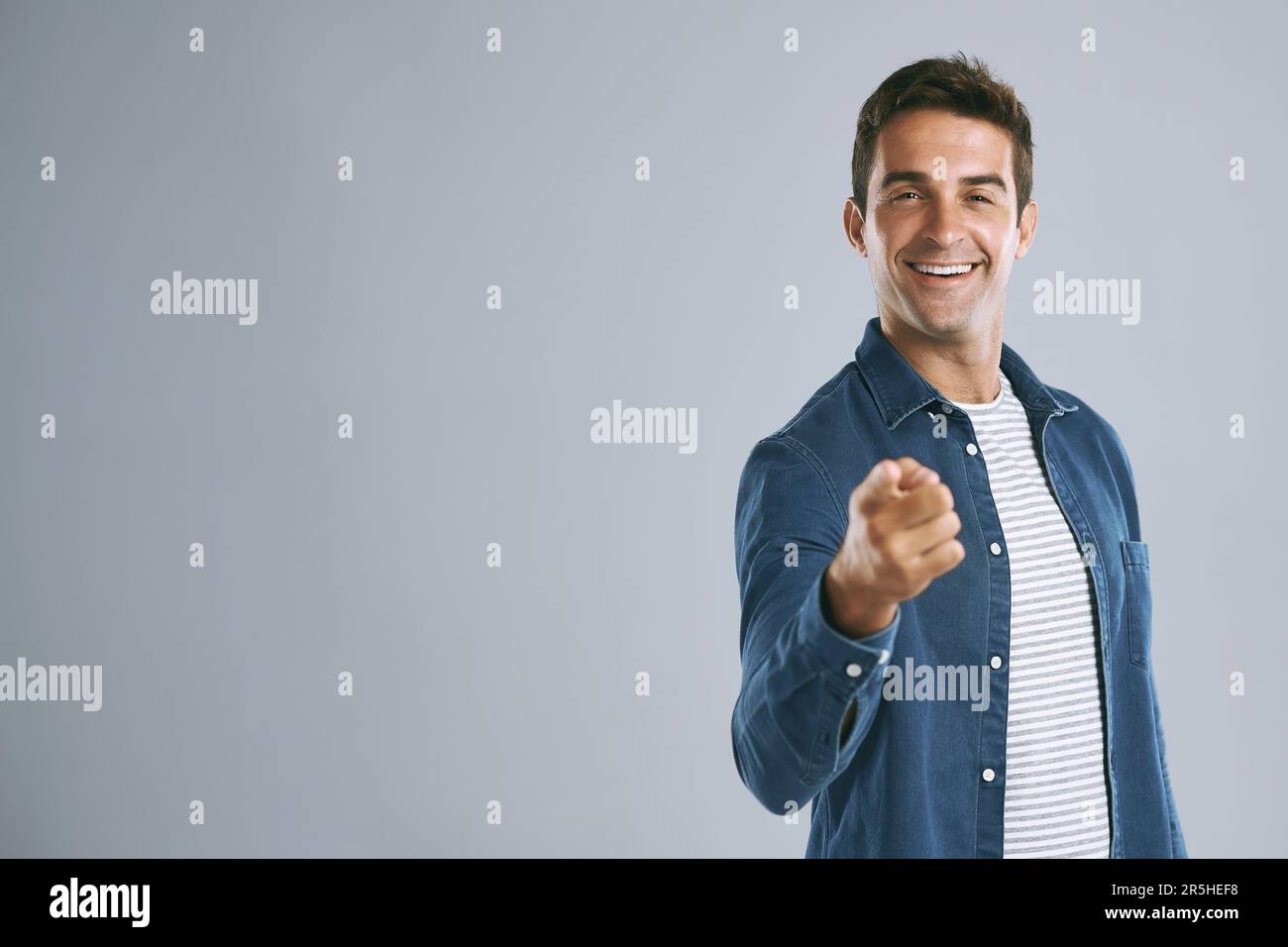 Youre the lucky winner. a handsome man pointing at the camera Stock ...