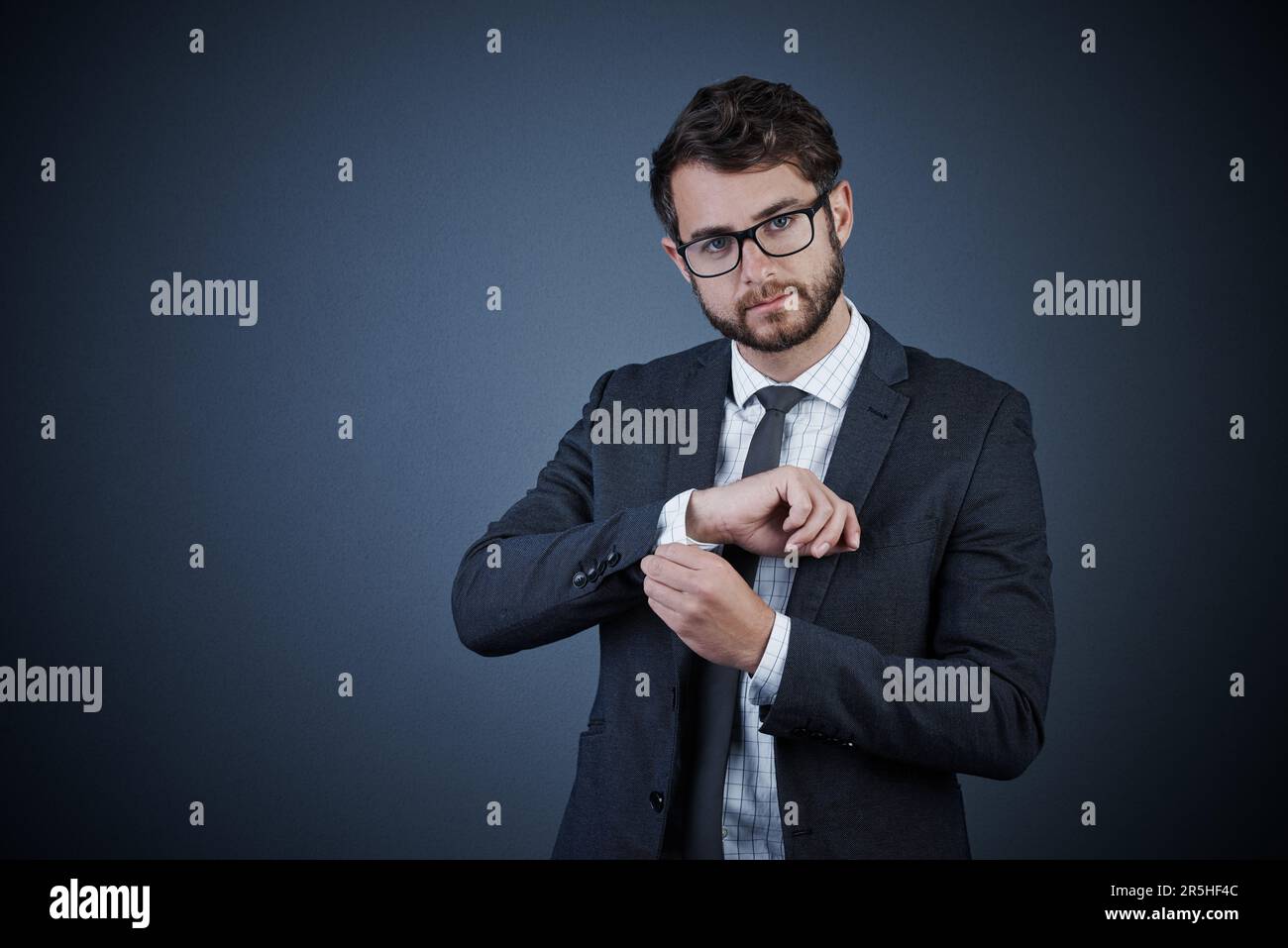 Businessman adjusting his cuffs hi-res stock photography and images - Alamy