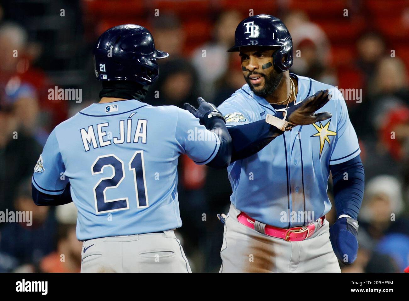 Tampa Bay Rays' Yandy Diaz and Francisco Mejia celebrate after scoring ...