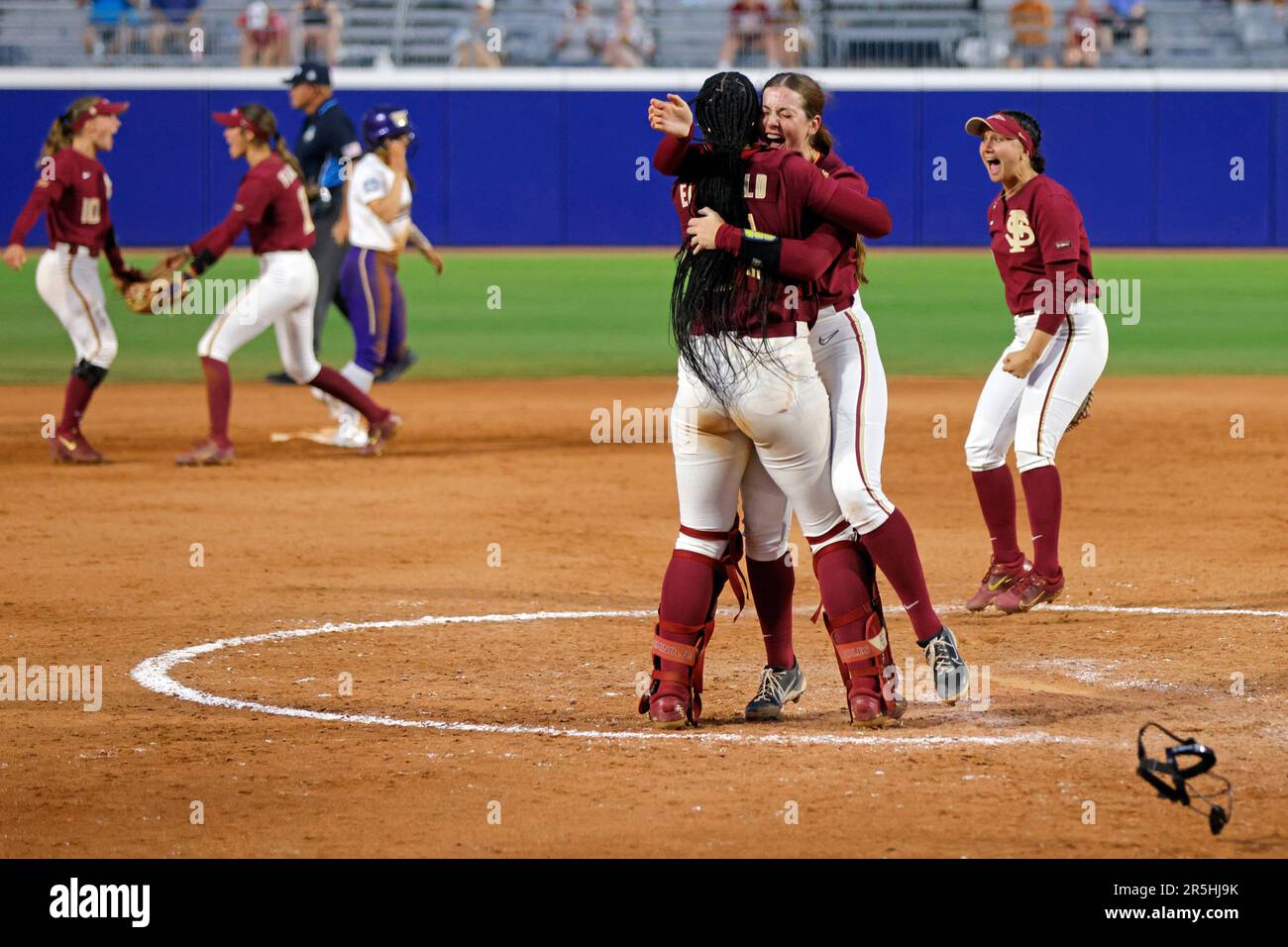 Florida State pitcher Kathryn Sandercock, second from right, hugs ...