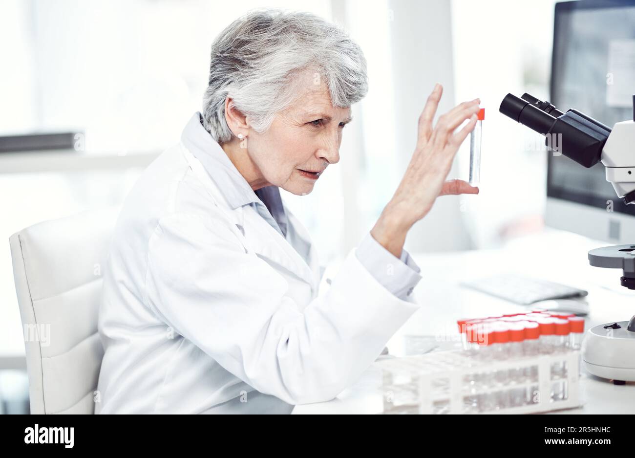 Serious scientist looks test hi-res stock photography and images - Alamy