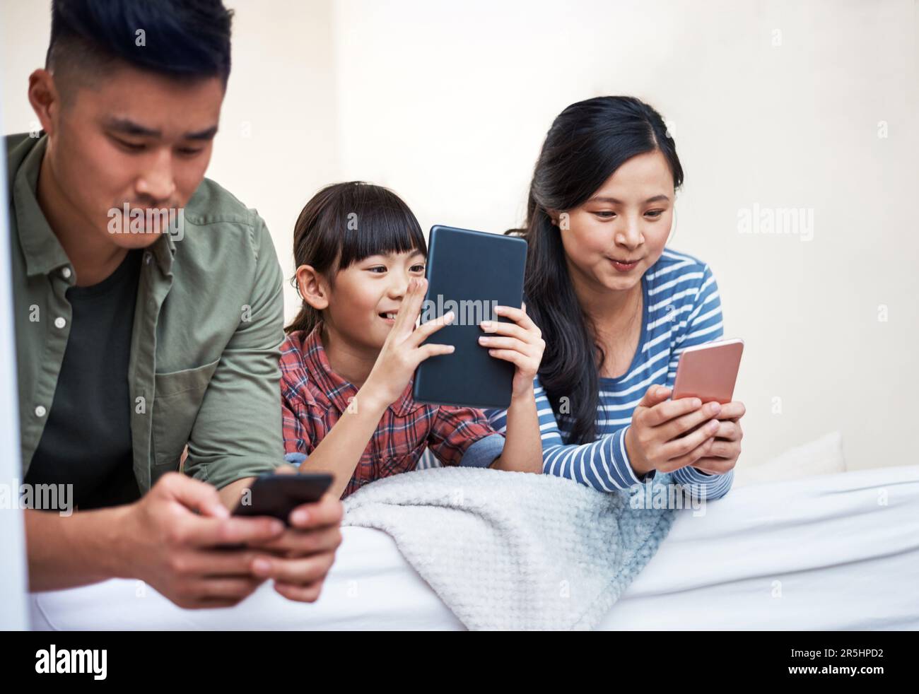 Kids engaged in technology hi-res stock photography and images - Alamy