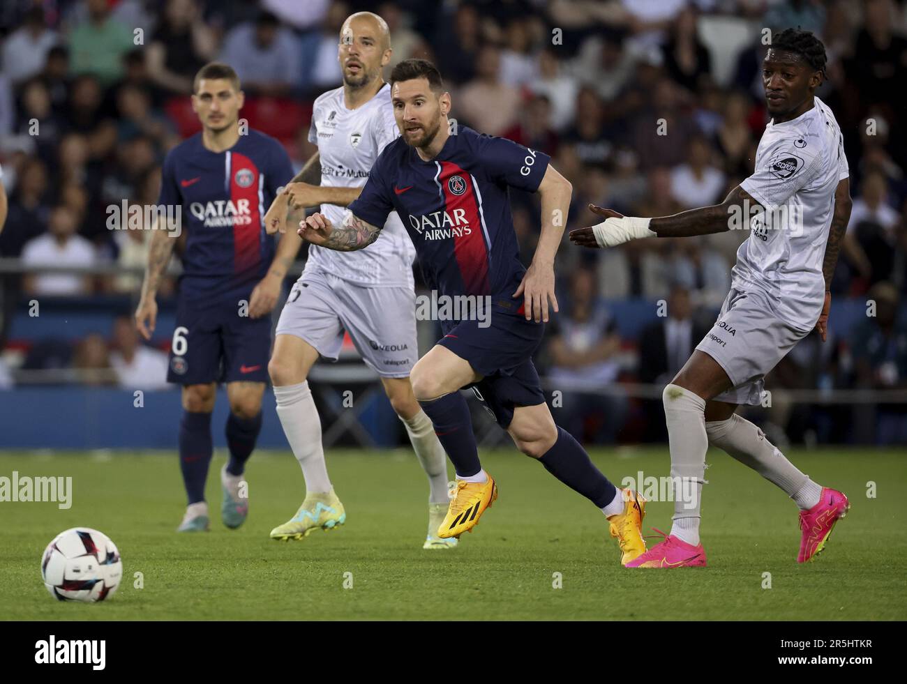 Lionel Messi of PSG between Johan Gastien and Muhammed Cham Saracevic ...