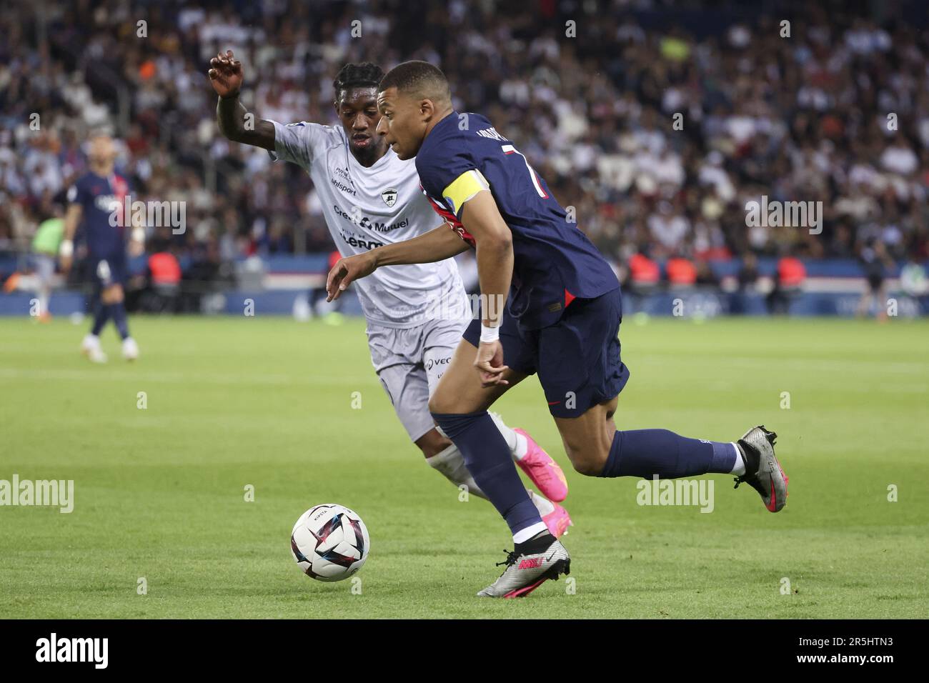 Kylian Mbappe of PSG, Muhammed Cham Saracevic of Clermont during the ...