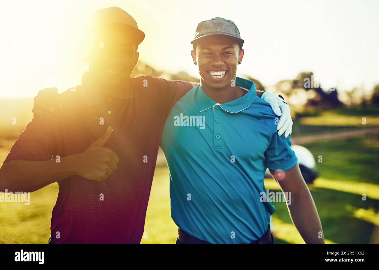 We had so much fun playing golf together. two friends standing together ...