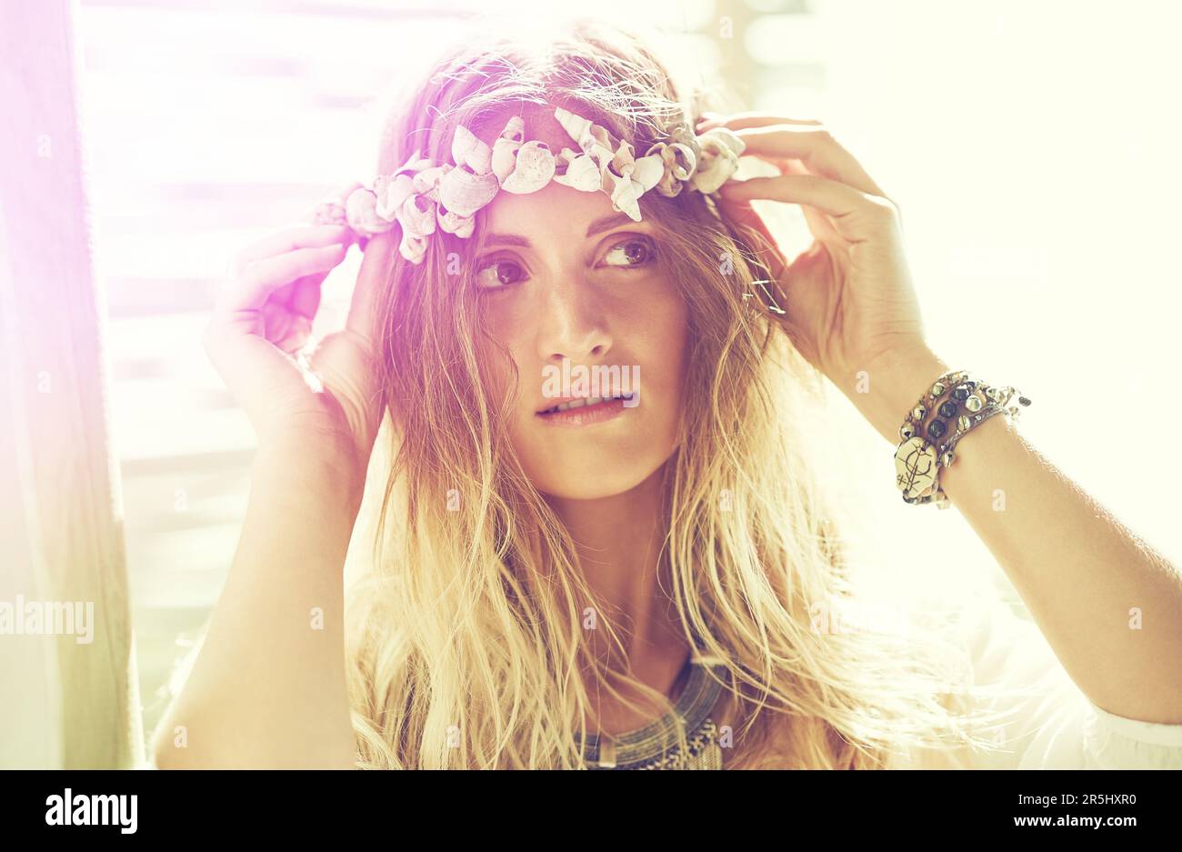 Every inch the boho beauty. an attractive young woman wearing a head ...