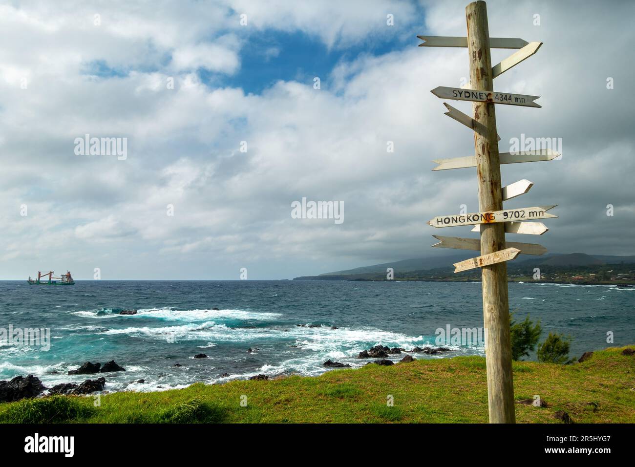 Wooden Post with Direction Signs at Hanga Roa Waterfront. Easter Island ...