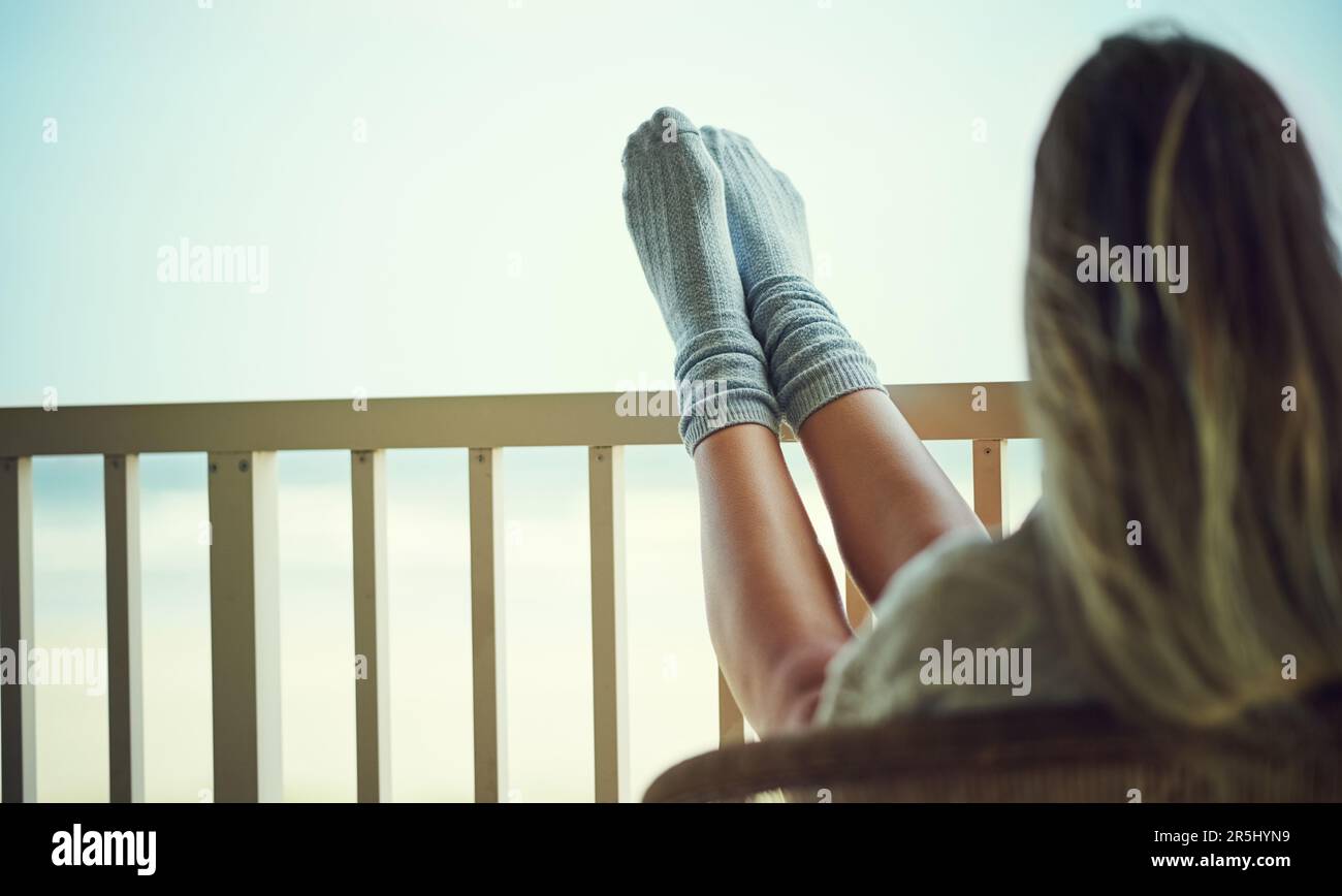 Woman feet up chair outside hi-res stock photography and images - Alamy