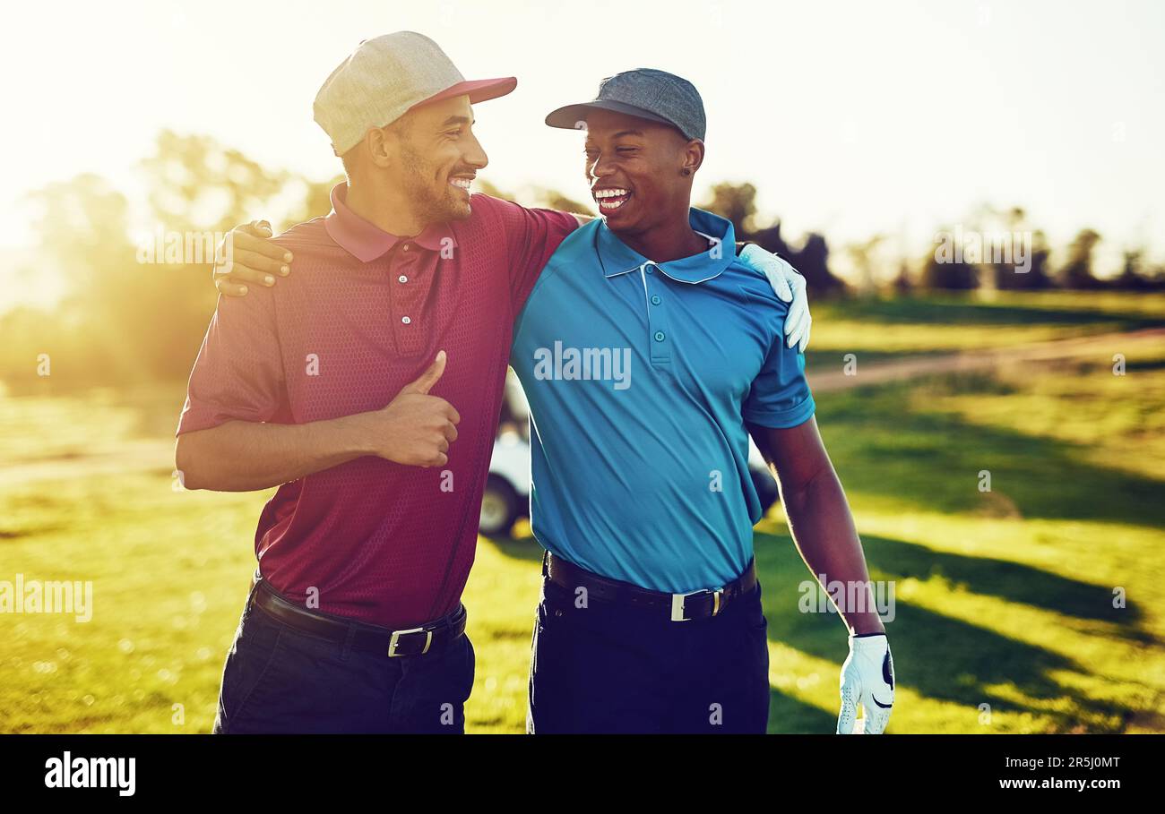 Bonding the best way we know how to. two friends standing together on a ...