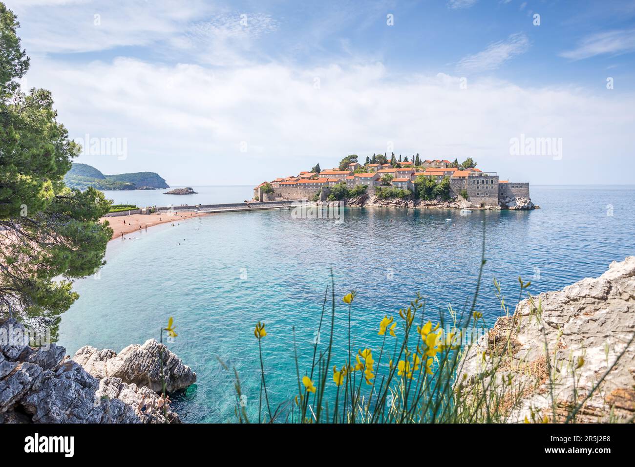 The beautiful island of Sveti Stefan jutting out into the Adriatic Sea ...
