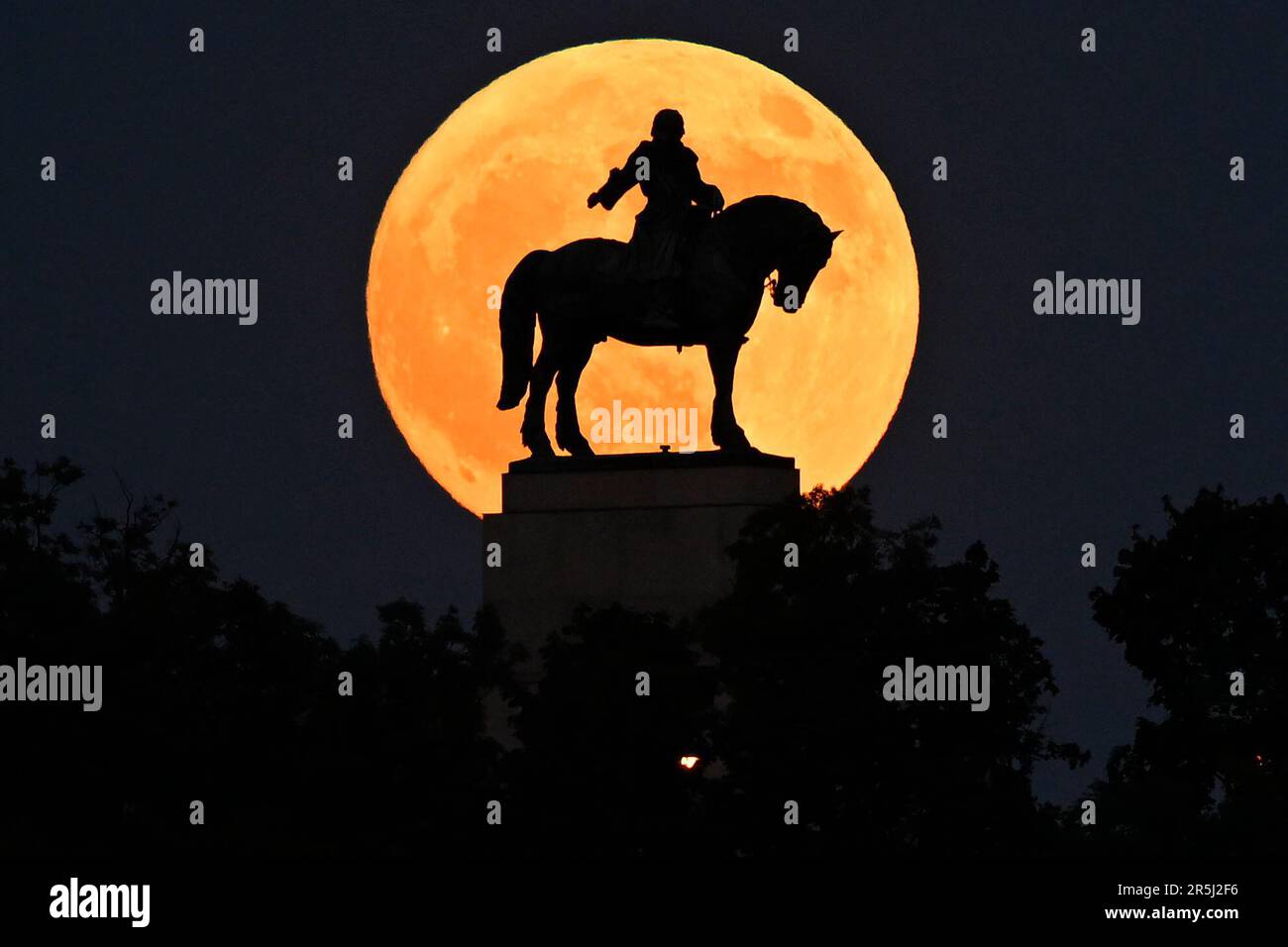 Prague, Czech Republic. 03rd June, 2023. Moonrise behind the equestrian ...