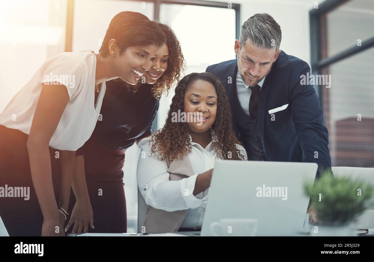 Shared success is a matter of collaboration. a group of colleagues ...