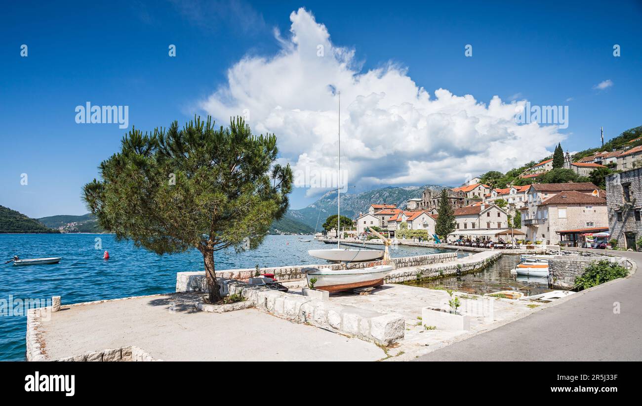 Wide angle image of pretty boats on the waterfront at Perast in ...