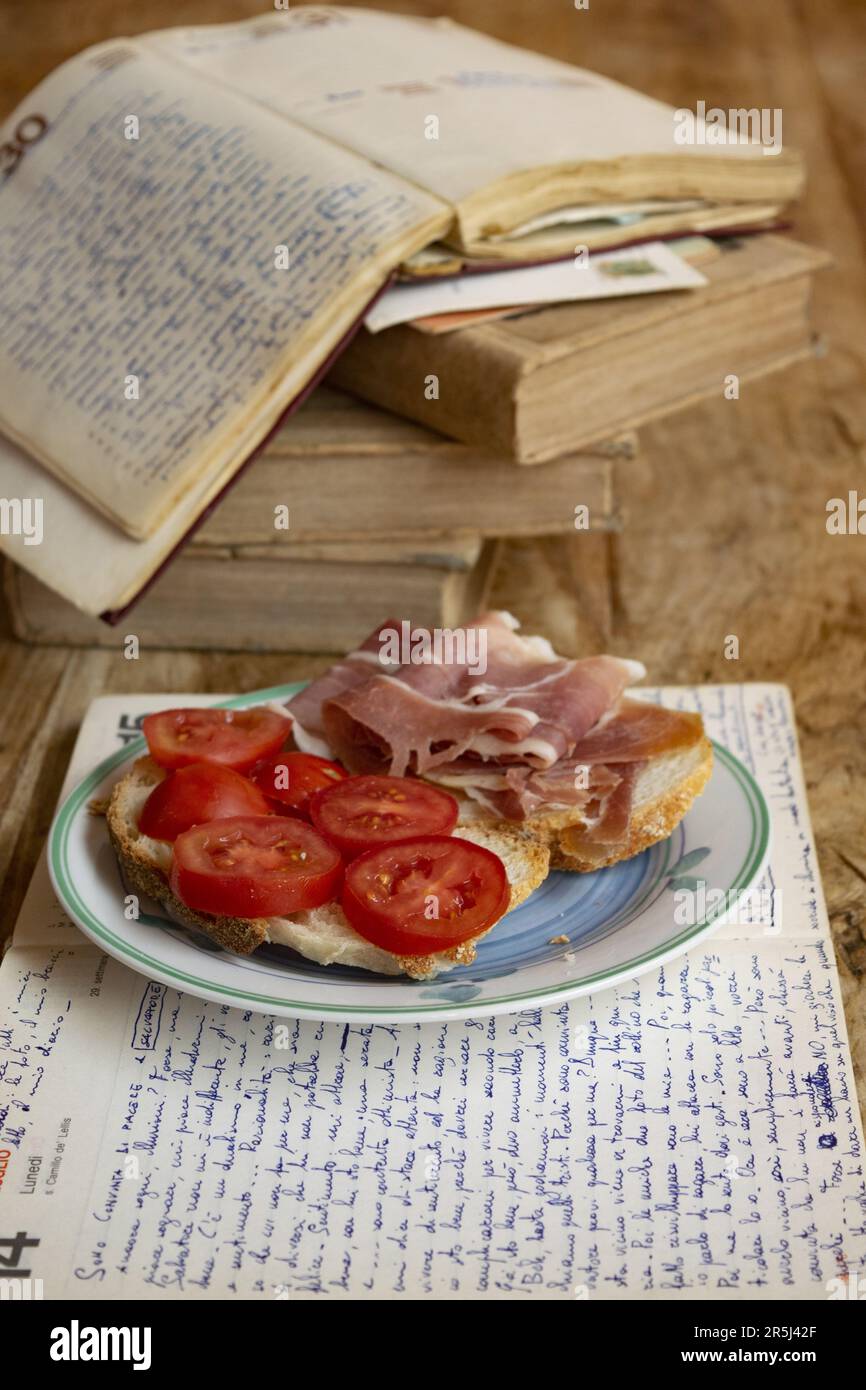 concept of concentration and fast snack while reading and writing Stock ...