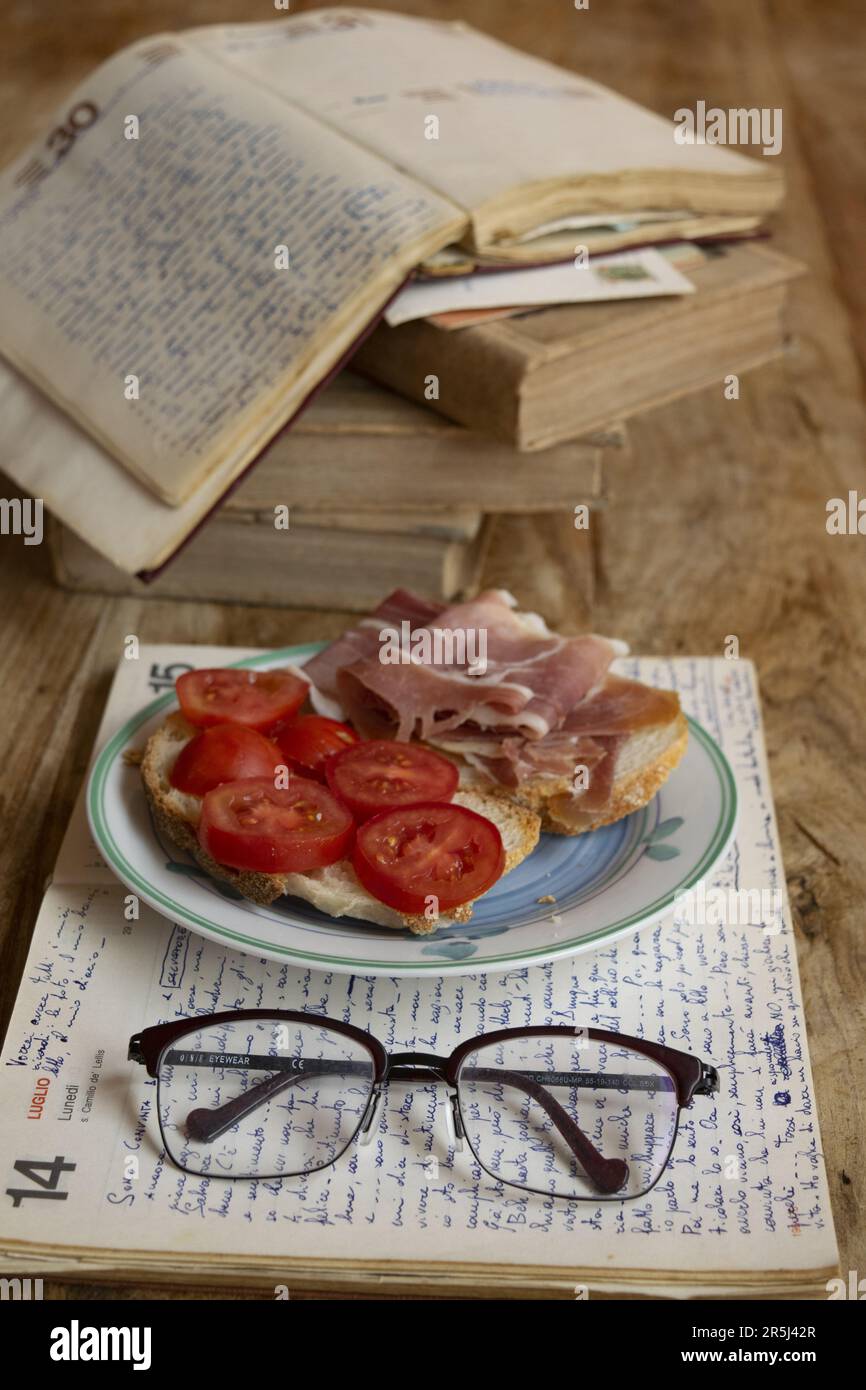 concept of concentration and fast snack while reading and writing Stock ...