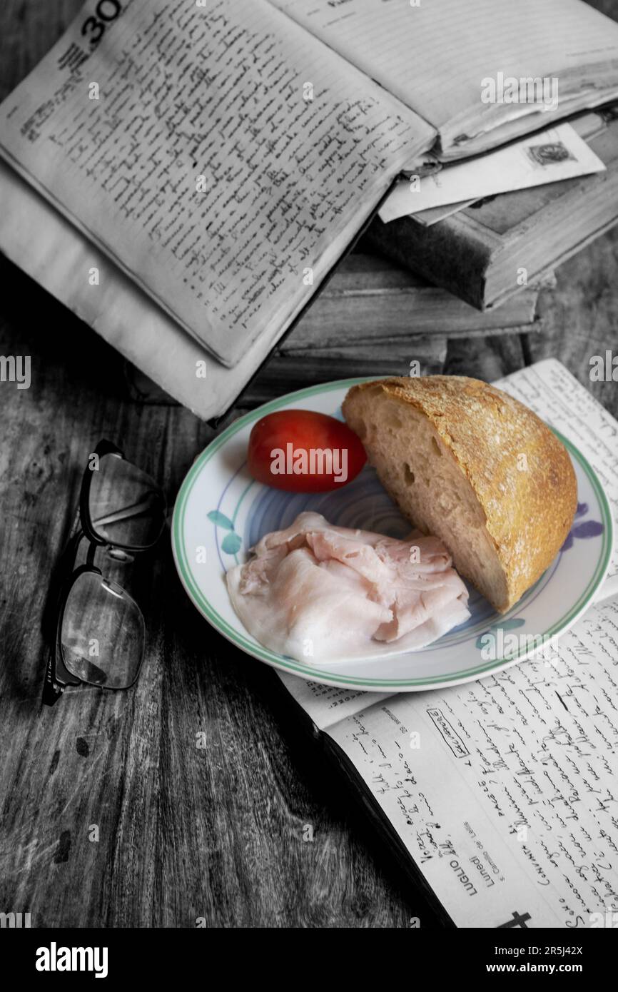 fast menu with bread and cooked ham while studying. Color and black and ...