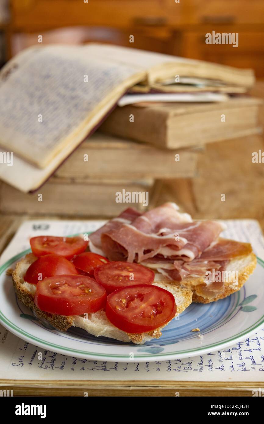 concept of concentration and fast snack while reading and writing Stock ...